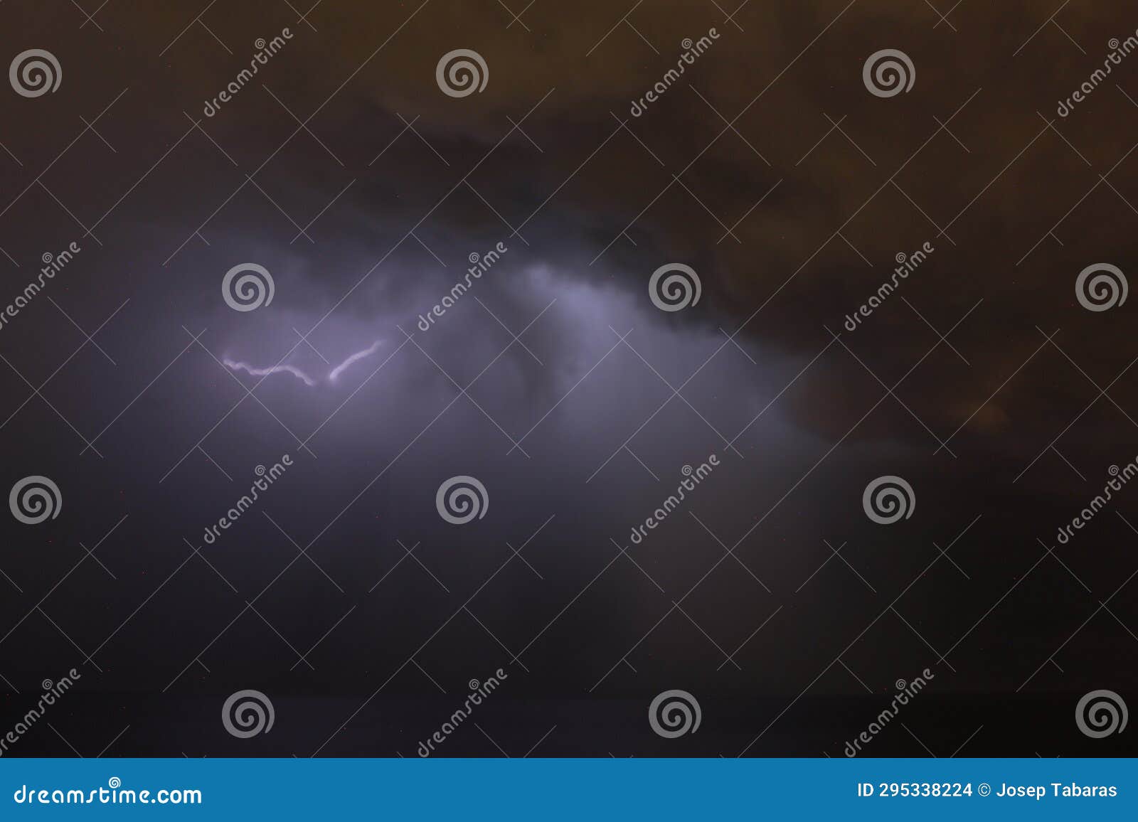 Lightning Piercing the Clouds in the Darkness of the Storm Stock Photo ...