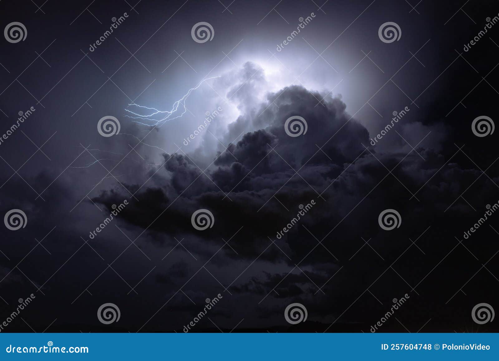 Lightning Radiates through the Clouds at Night Stock Photo - Image of ...