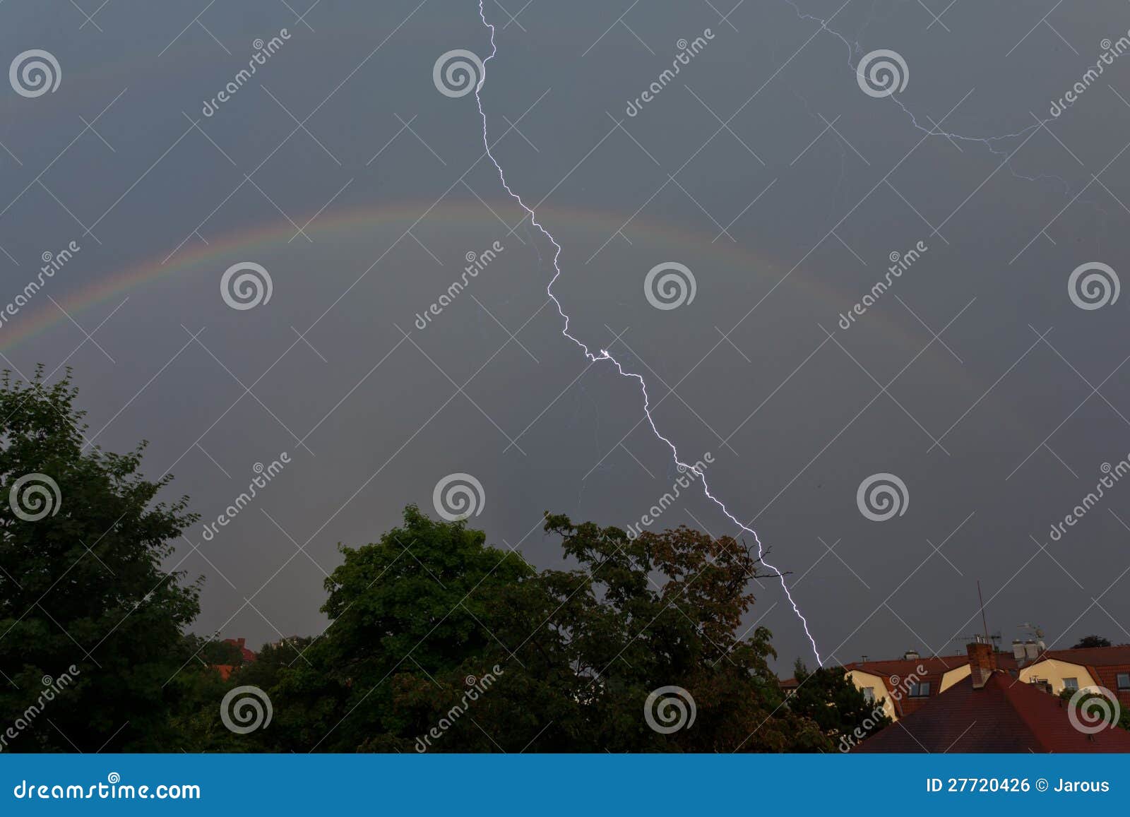 Lightning and rainbow stock photo. Image of colors, city - 27720426
