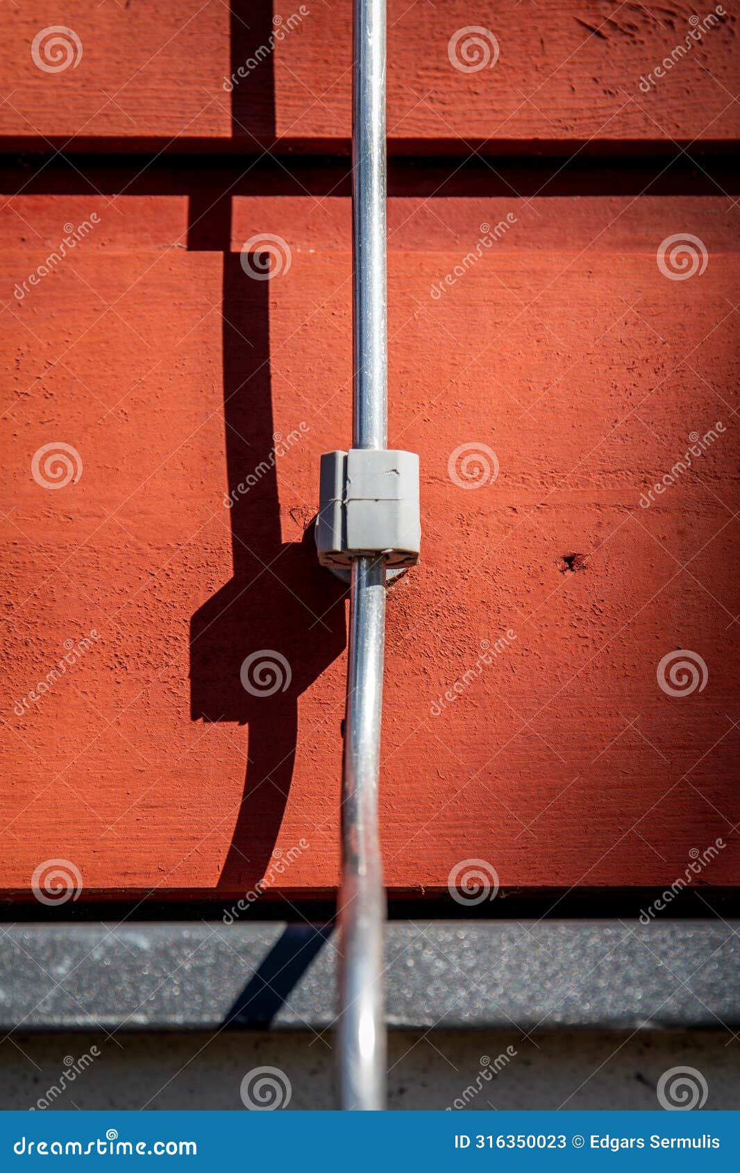 Lightning Rod on the Wall of a Red Wooden Building. Architecture and ...