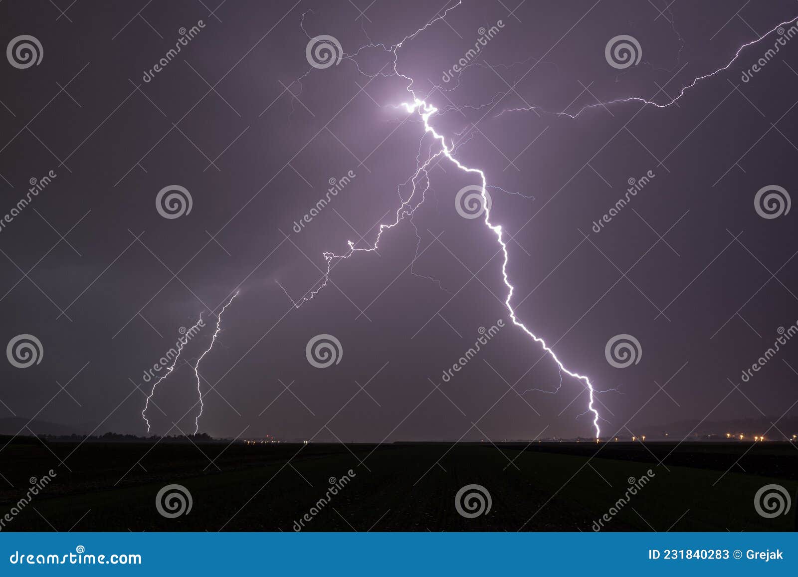 Lightning Strike at night stock image. Image of energy - 231840283