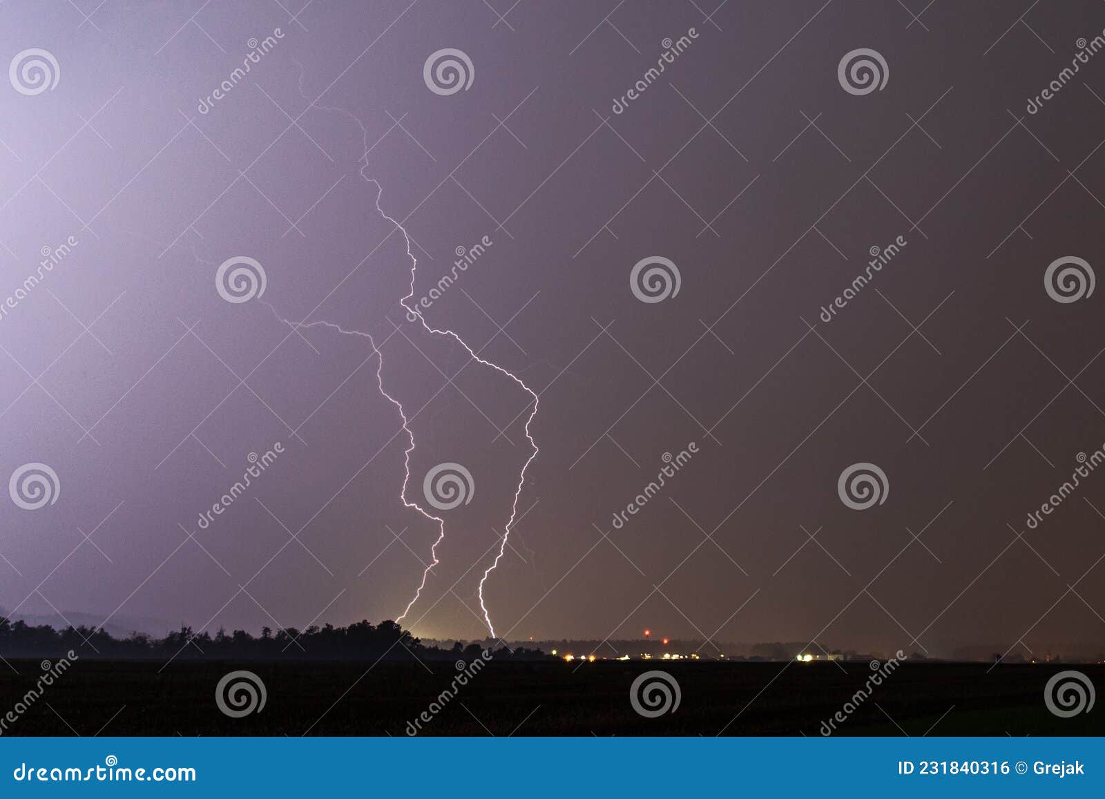 Lightning Strike at night stock photo. Image of stormy - 231840316