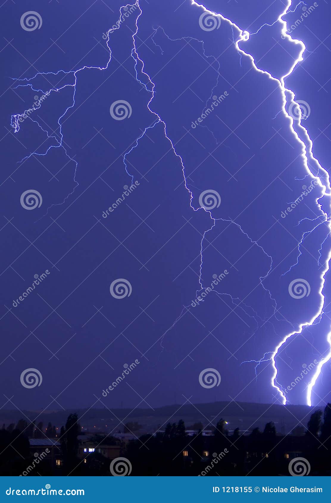 Lightning strikes at night stock image. Image of power - 1218155