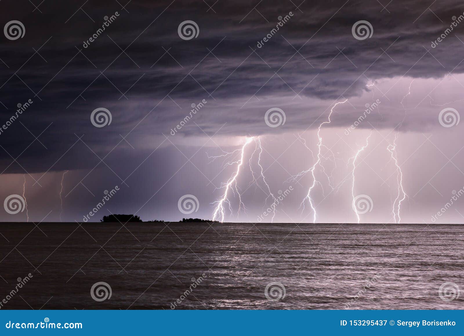 Lightning strikes the sea. stock image. Image of lightning - 153295437