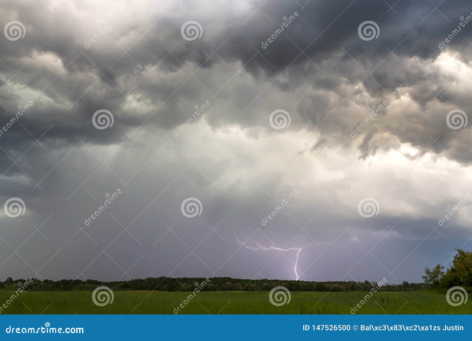 The Lightning Strikes between Stormy Clouds Stock Photo - Image of ...