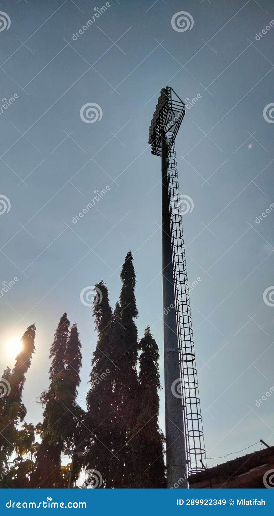 A Lightning Tower of a Sport Stadium Stock Image - Image of tree ...
