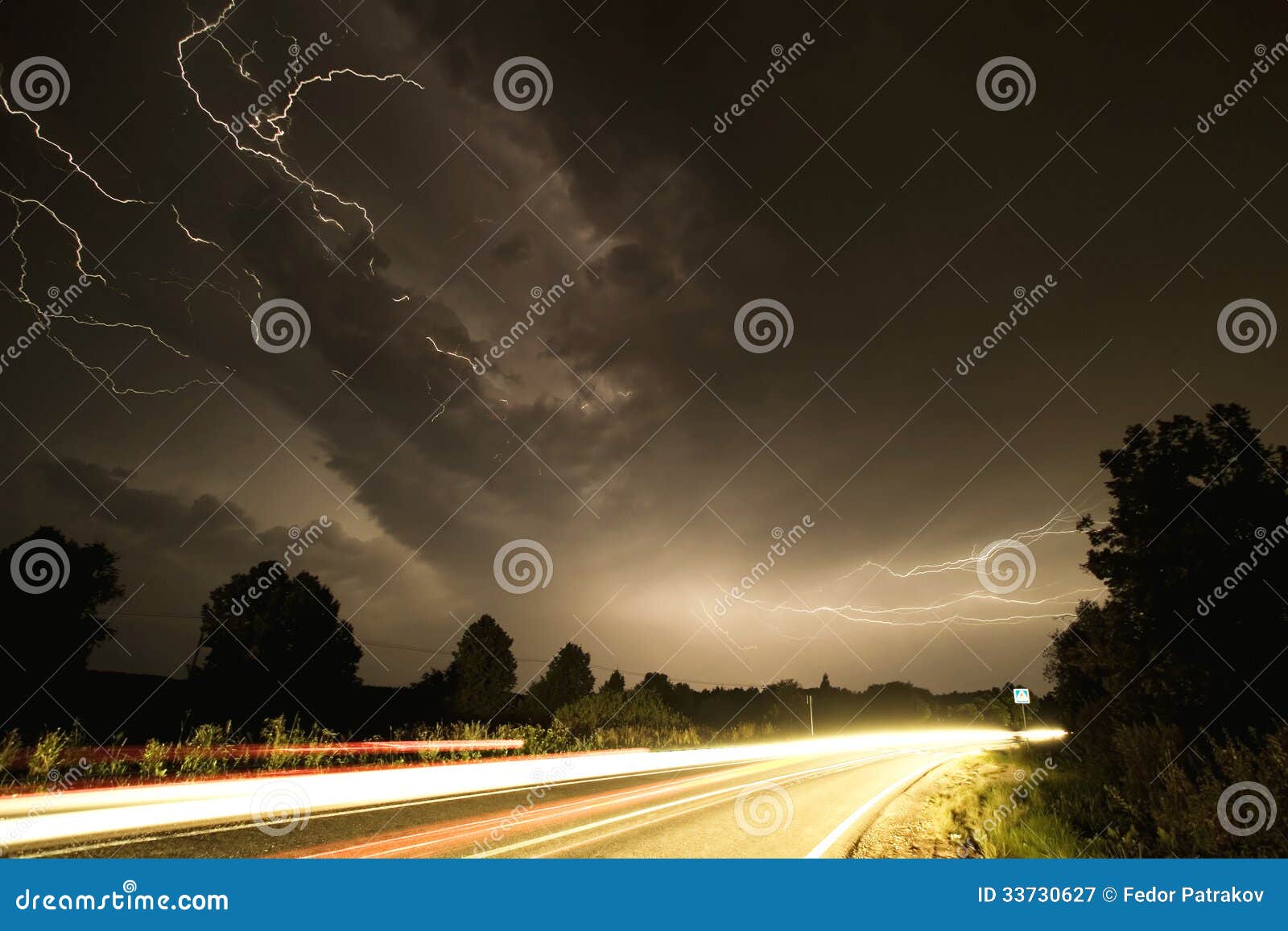 Lightnings over the road stock image. Image of event - 33730627