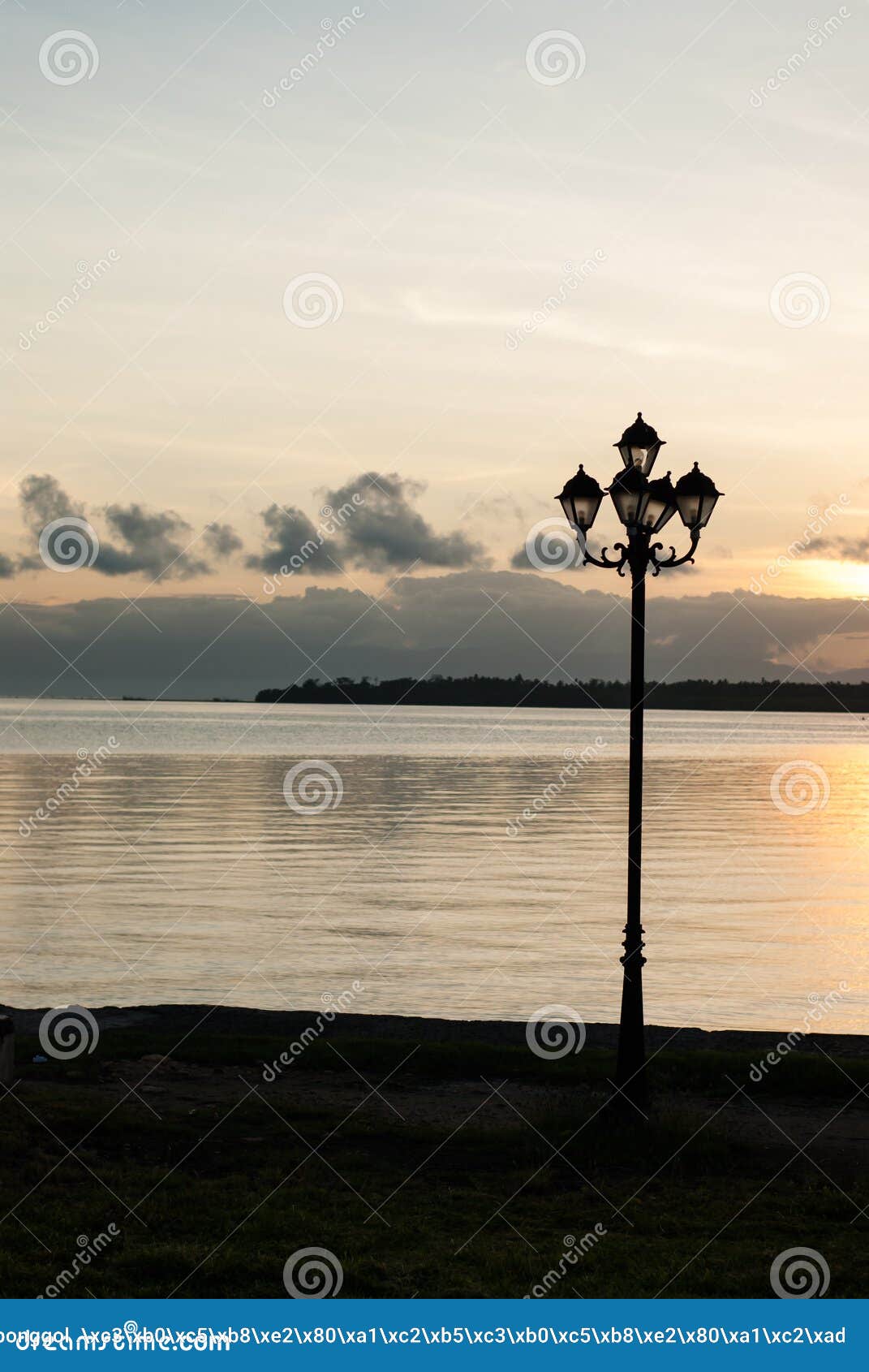 Lightpost by the Bay at Sunrise Stock Photo - Image of nature, outdoor ...