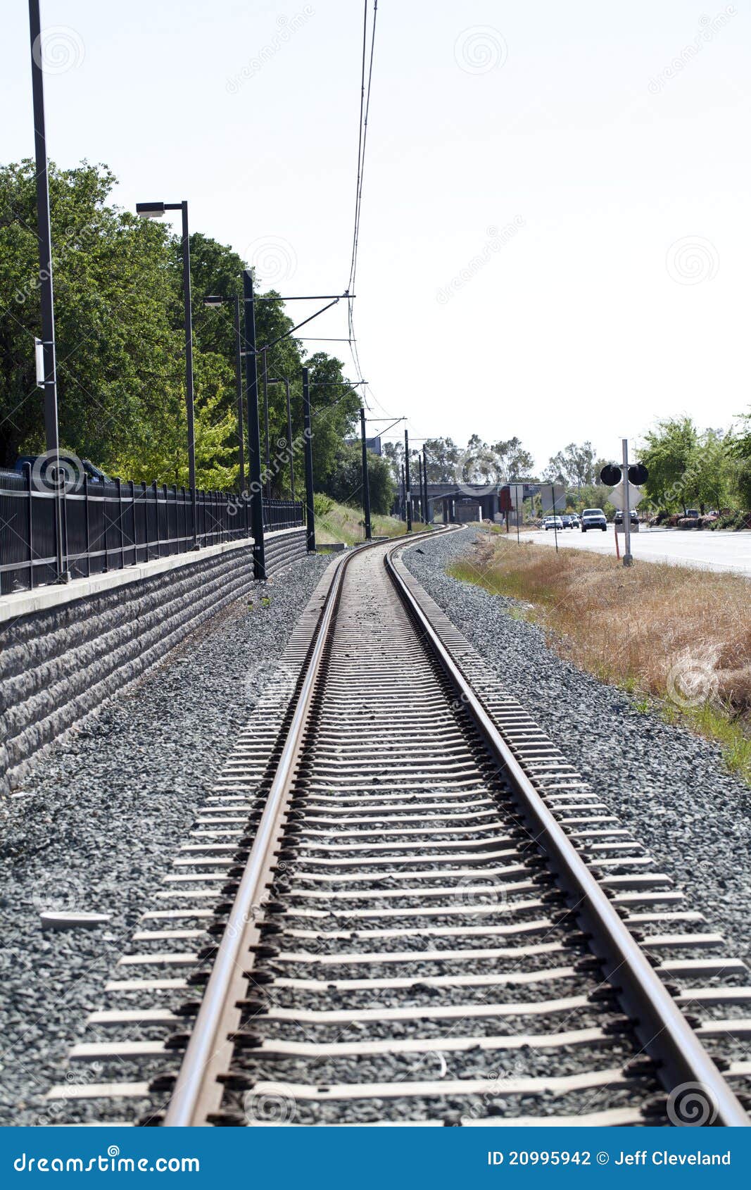 Lightrail Tracks and Road with Traffic Stock Photo - Image of curve ...