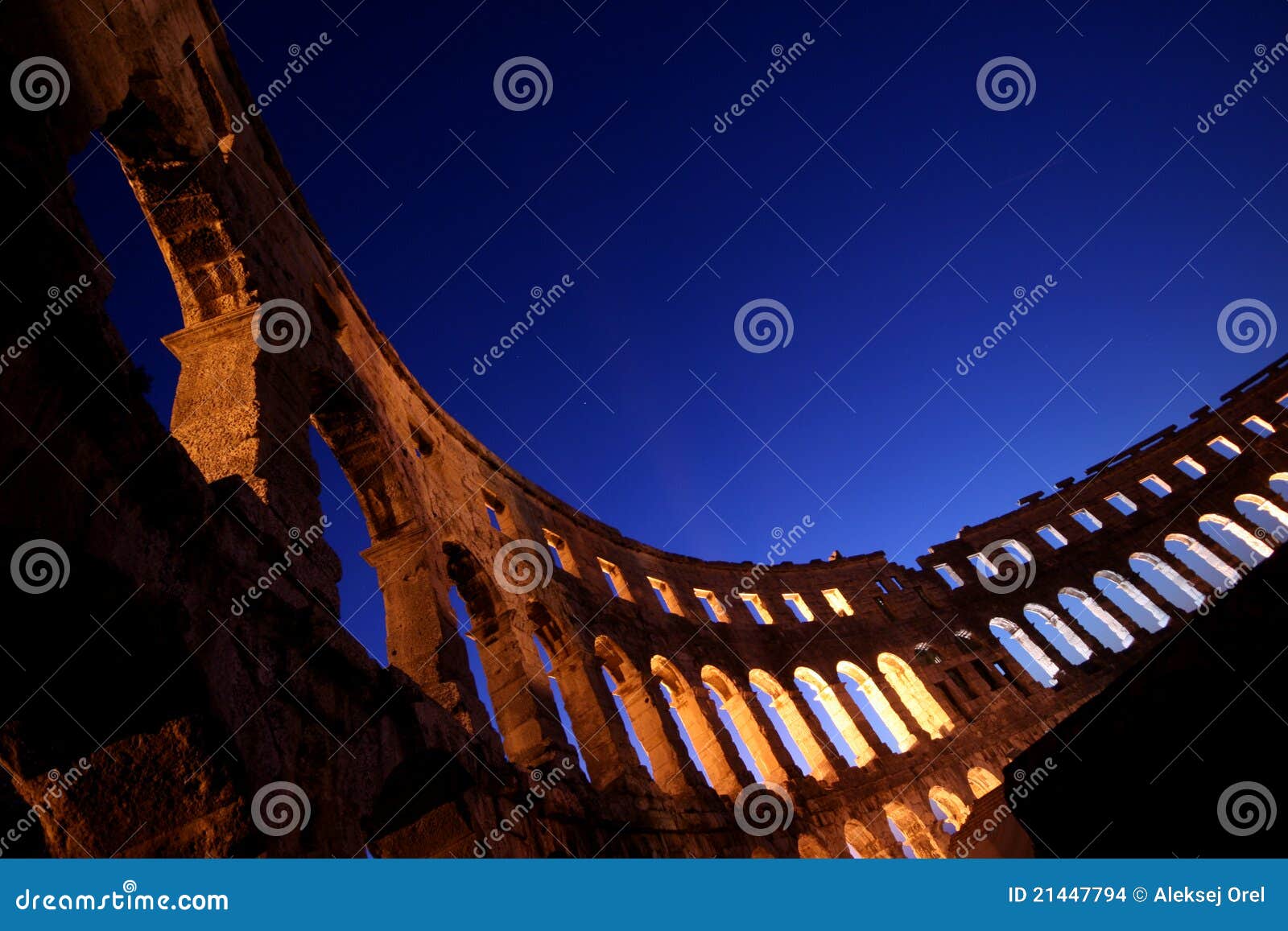 Lights through the Arches of the Amphitheatre in P Stock Photo - Image ...