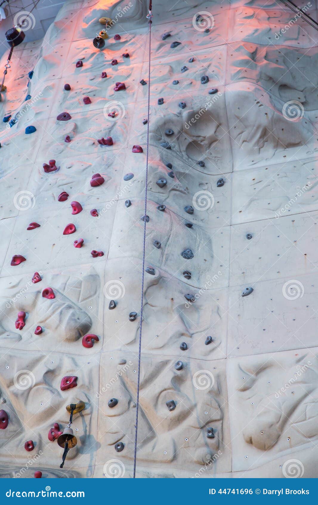 Lights and Bells on Rock Climbing Wall Stock Photo - Image of ...
