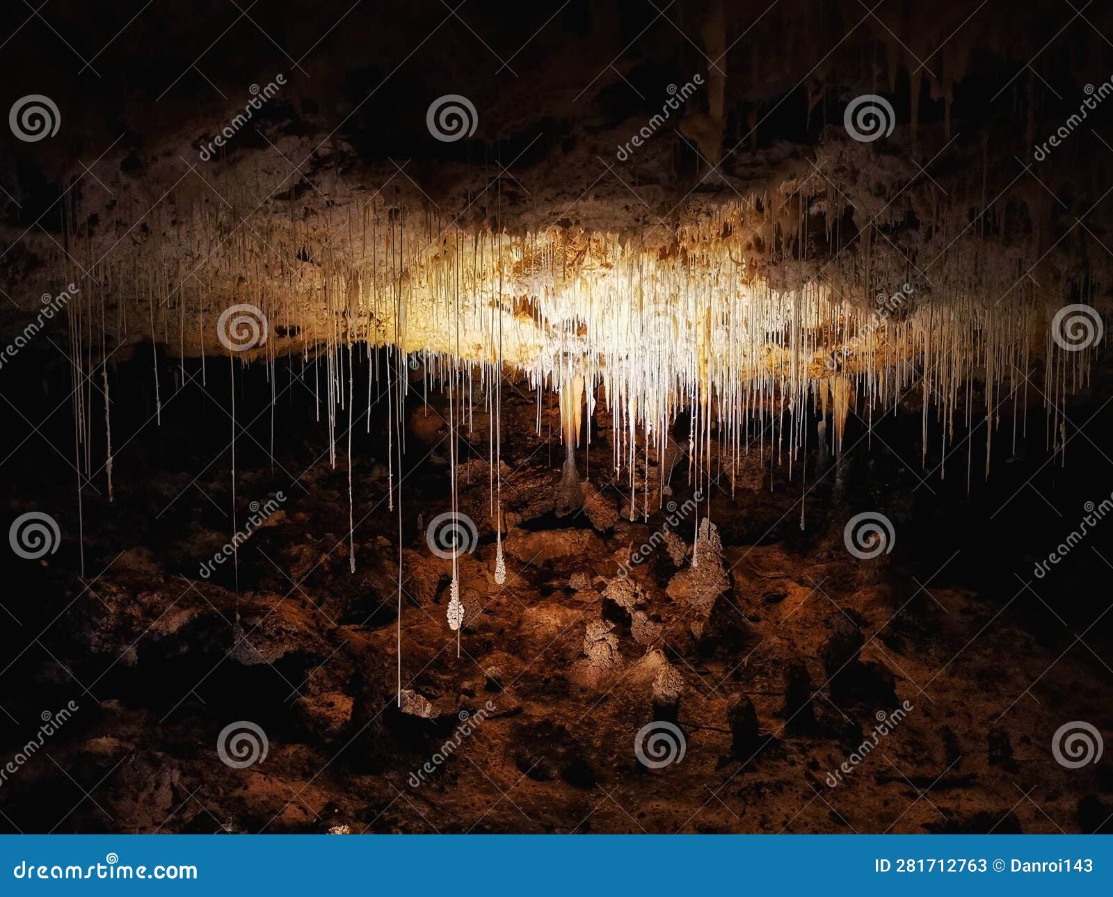 Lights of a cave stock image. Image of person, night - 281712763