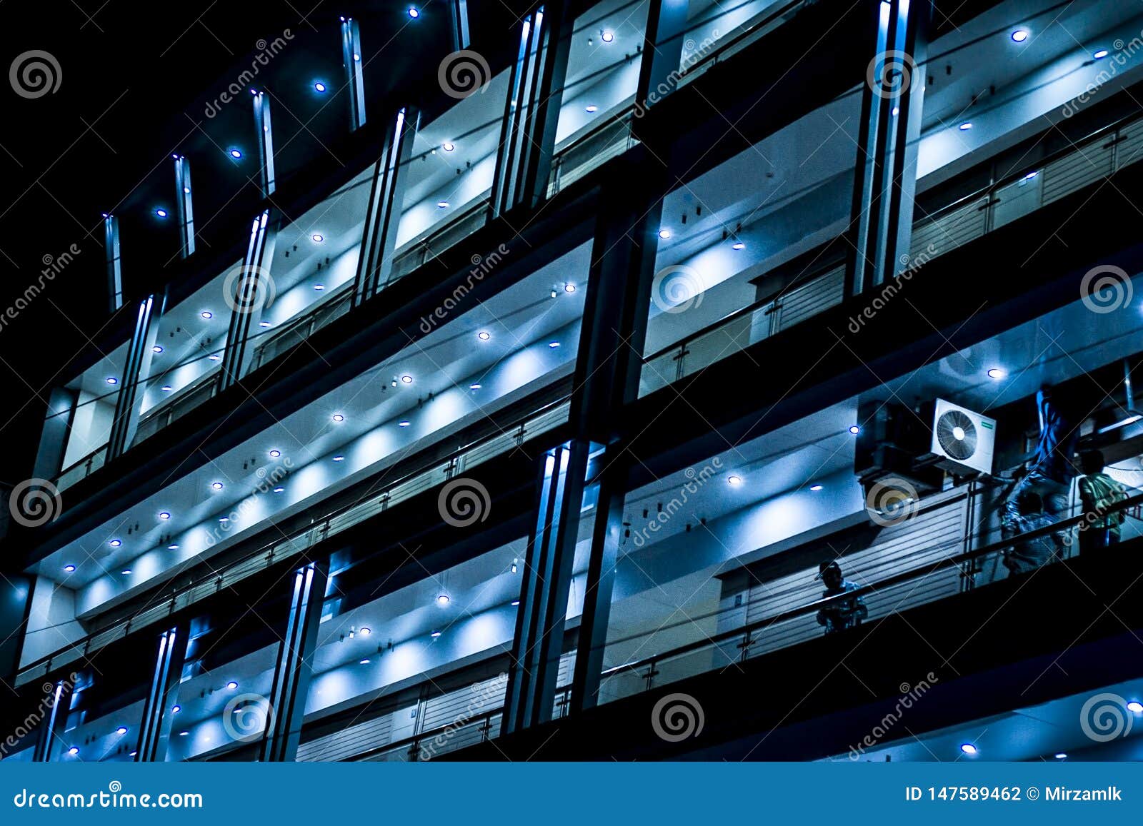 Lights in the Dark.a Building Shining with Blue or Yellow Colored ...