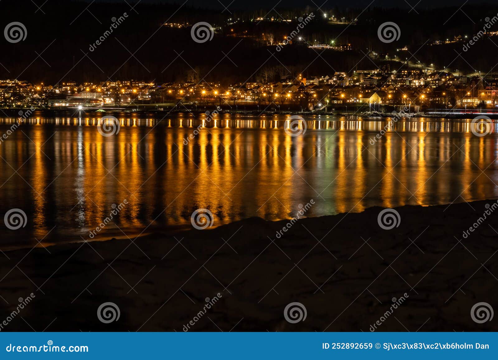 Town Lights Reflecting in a Lake at Night Stock Image - Image of ...