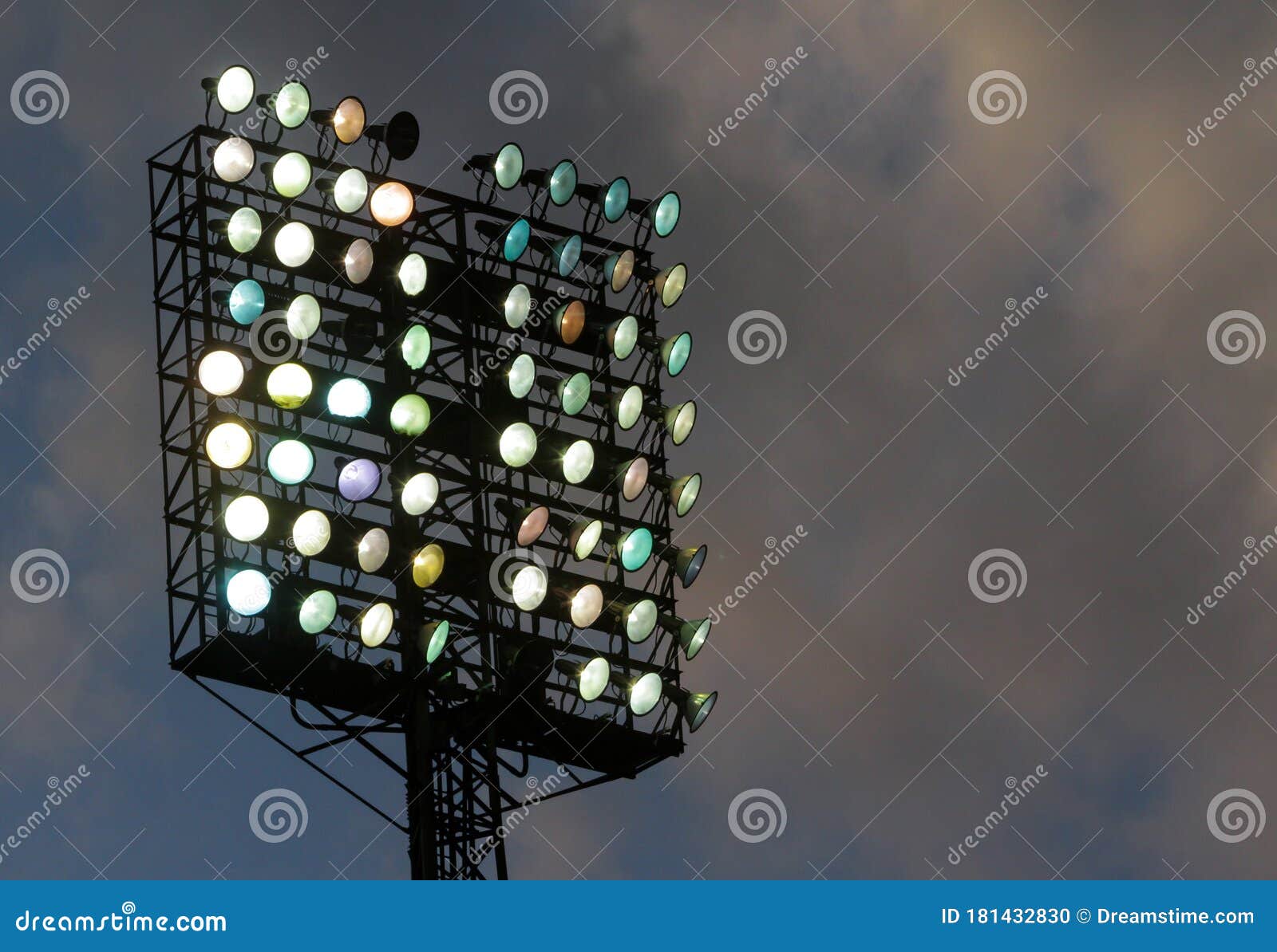 Lights on in One of the Light Towers of a Sports Stadium Stock Photo ...