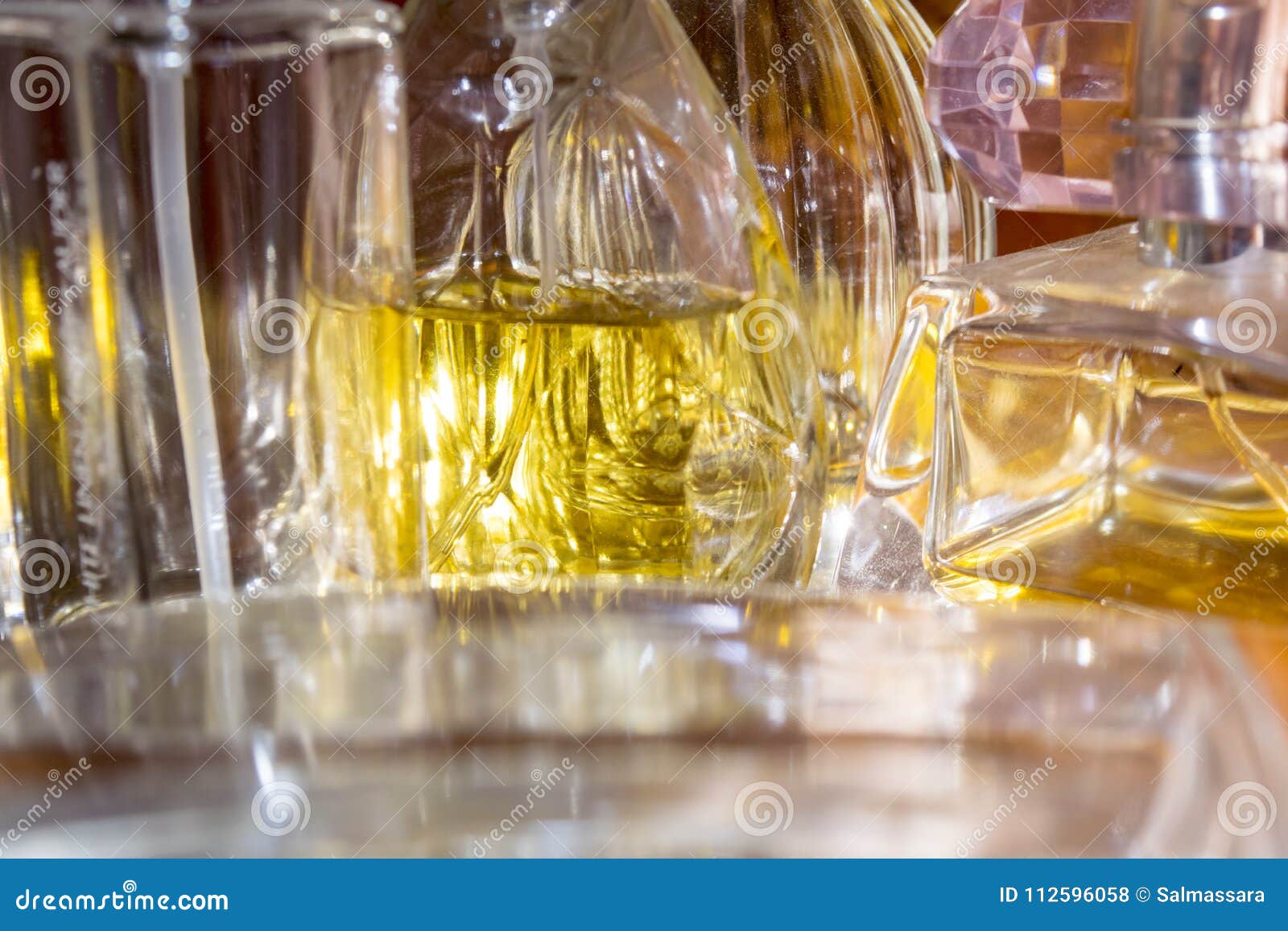 Lights and Textures in Perfume Bottles Stock Photo - Image of fragrance ...