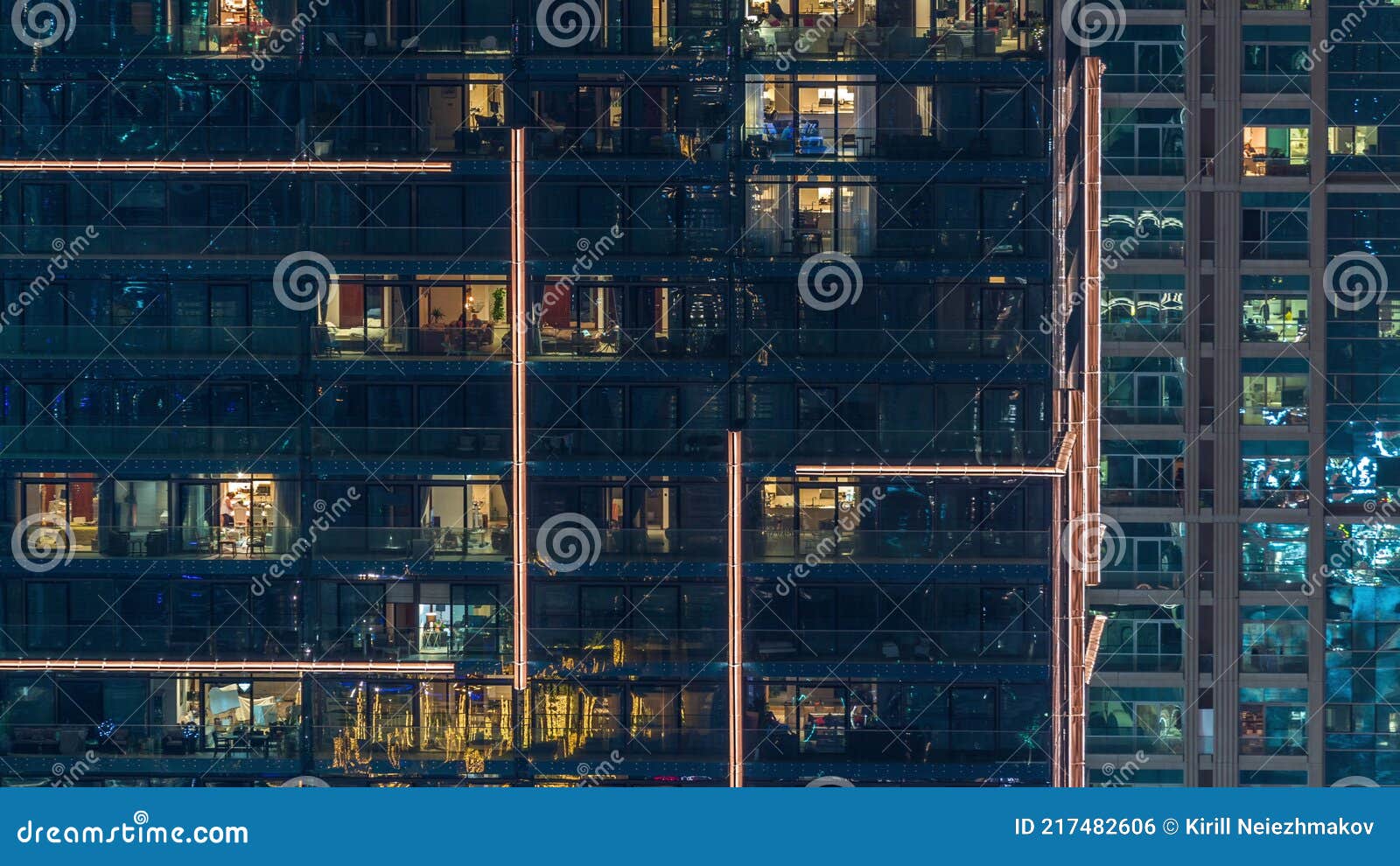 Lights in Windows of Modern Multiple Story Building in Urban Setting at ...
