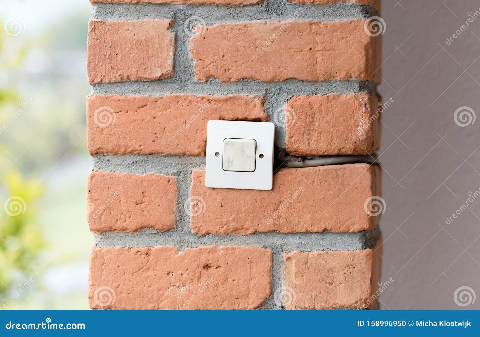 Lightswitch in a Brick Wall Stock Photo - Image of simple, light: 158996950
