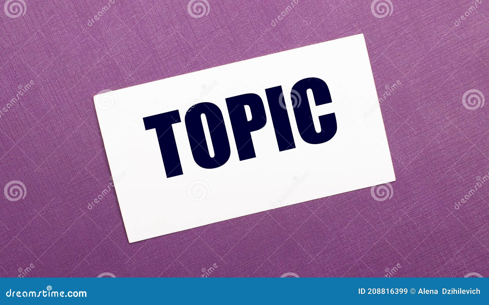 On a Lilac Background a White Card with the Word TOPIC Stock Image ...