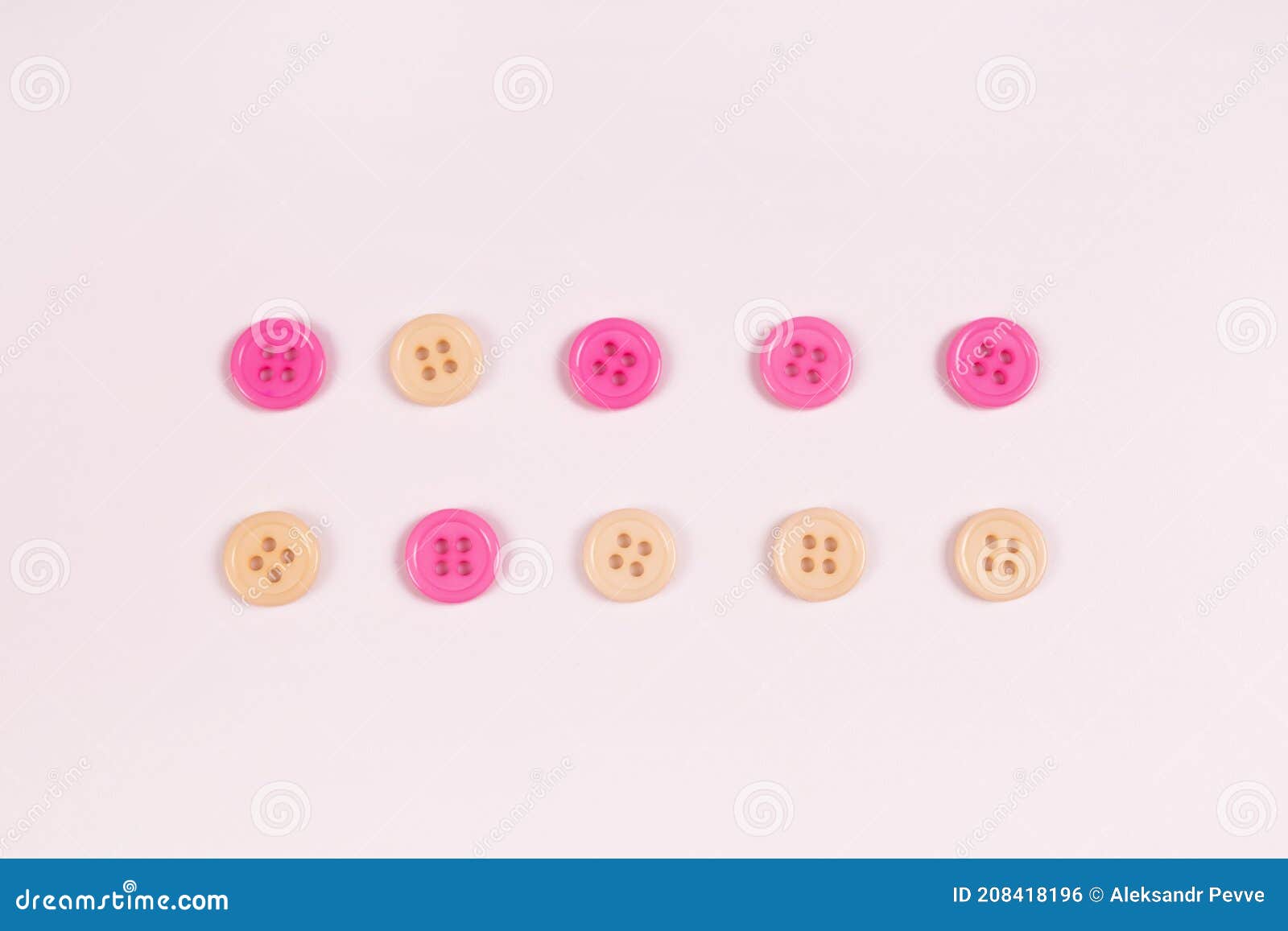 Lilac and Beige Buttons are Folded in Two Parallel Lines; the Second ...