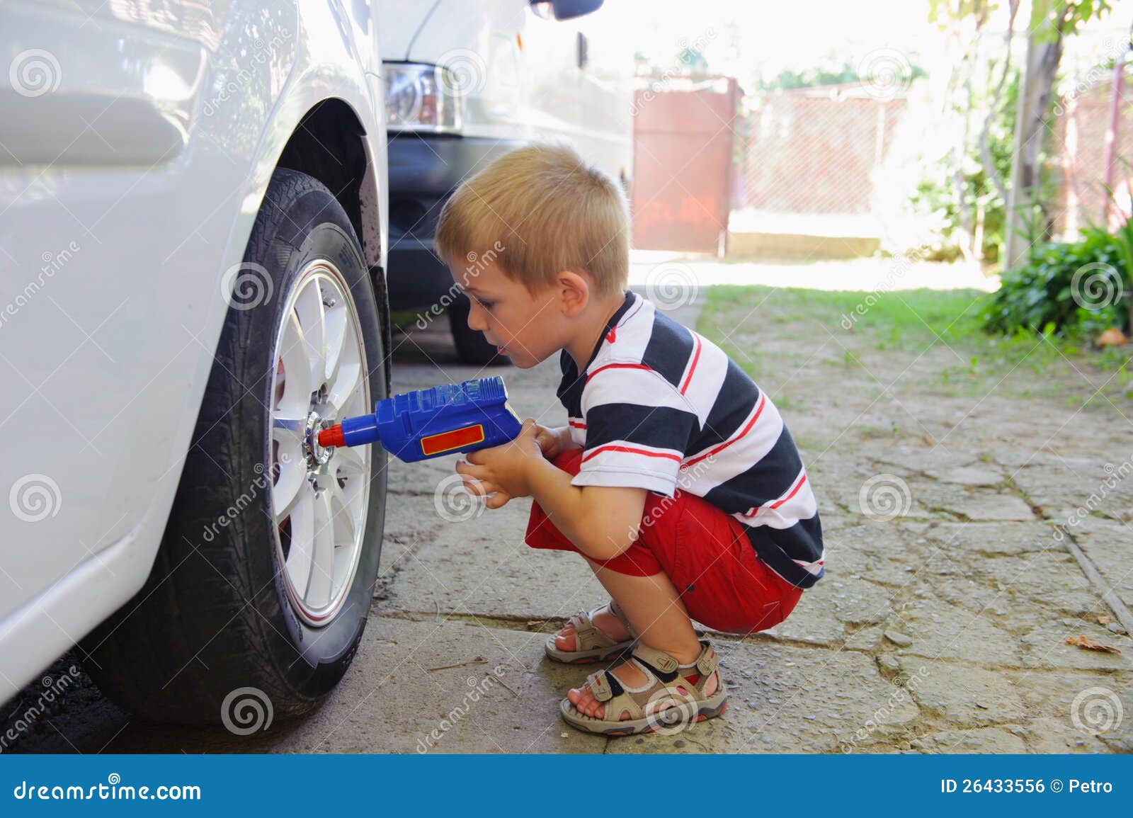 Lillte Child Playing in Auto Mechanic Stock Photo - Image of hand, male ...