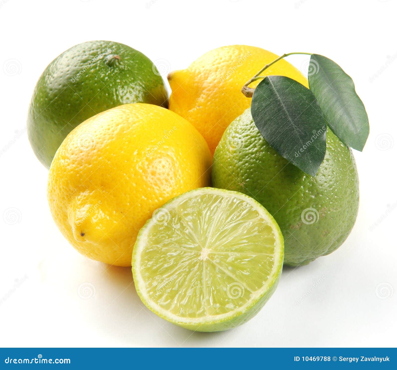 Limón y cal con las hojas foto de archivo. Imagen de alimento - 10469788