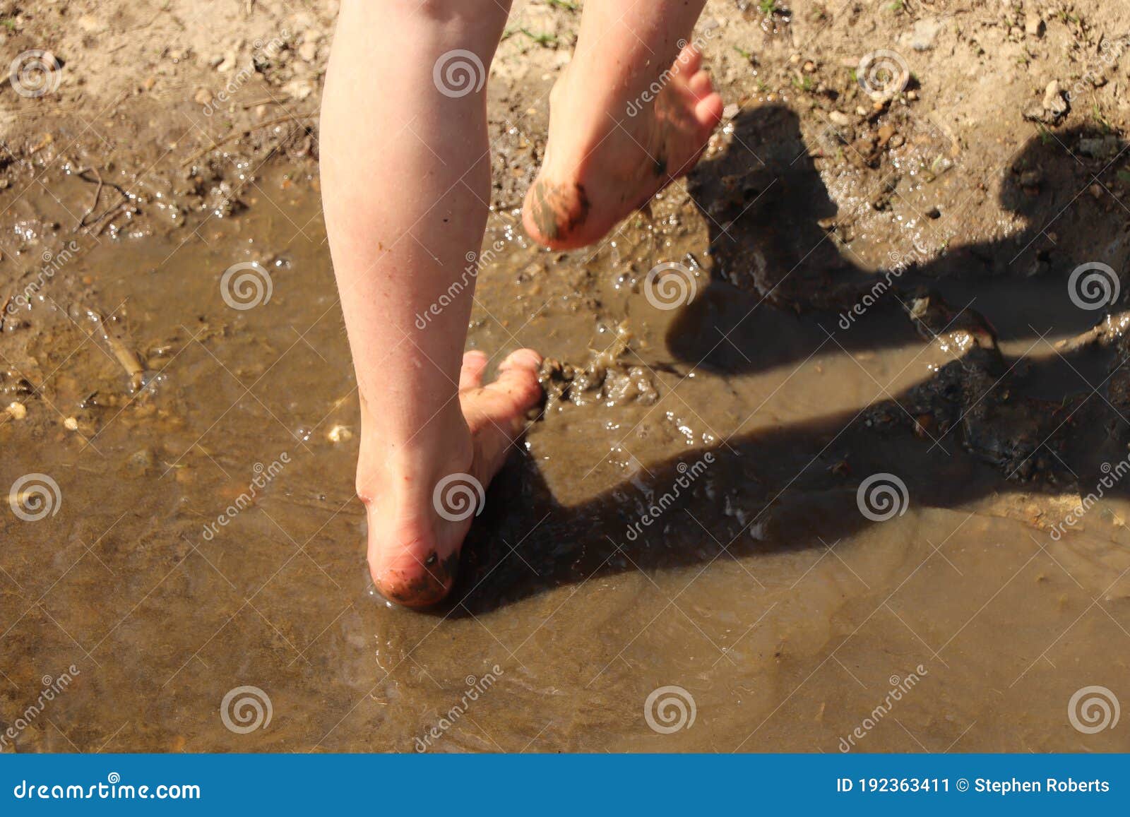 Limbs Rolling Around in the River Mud Stock Image - Image of foot ...