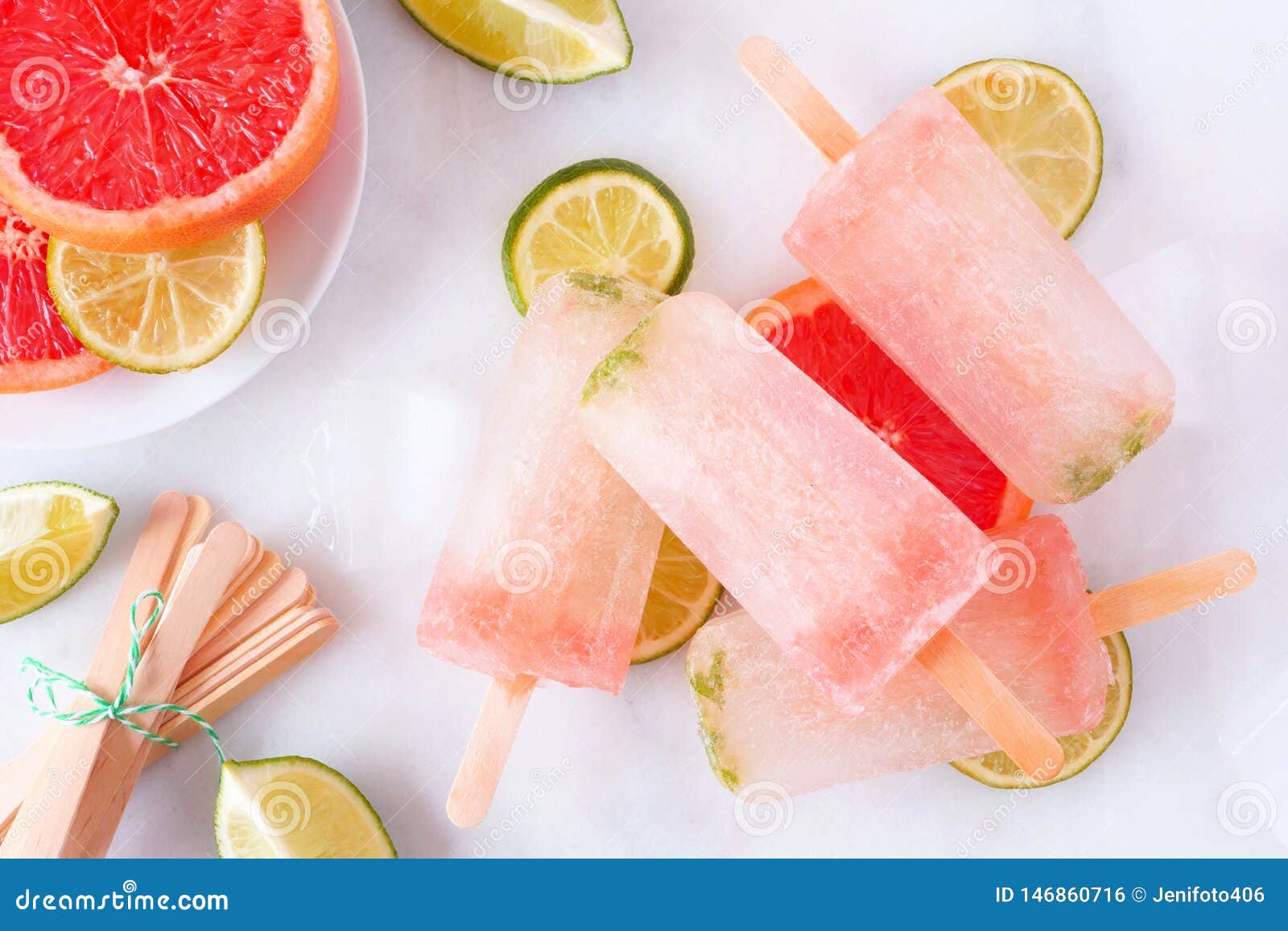 Lime and Grapefruit Popsicles, Top View Table Scene Over White Marble ...