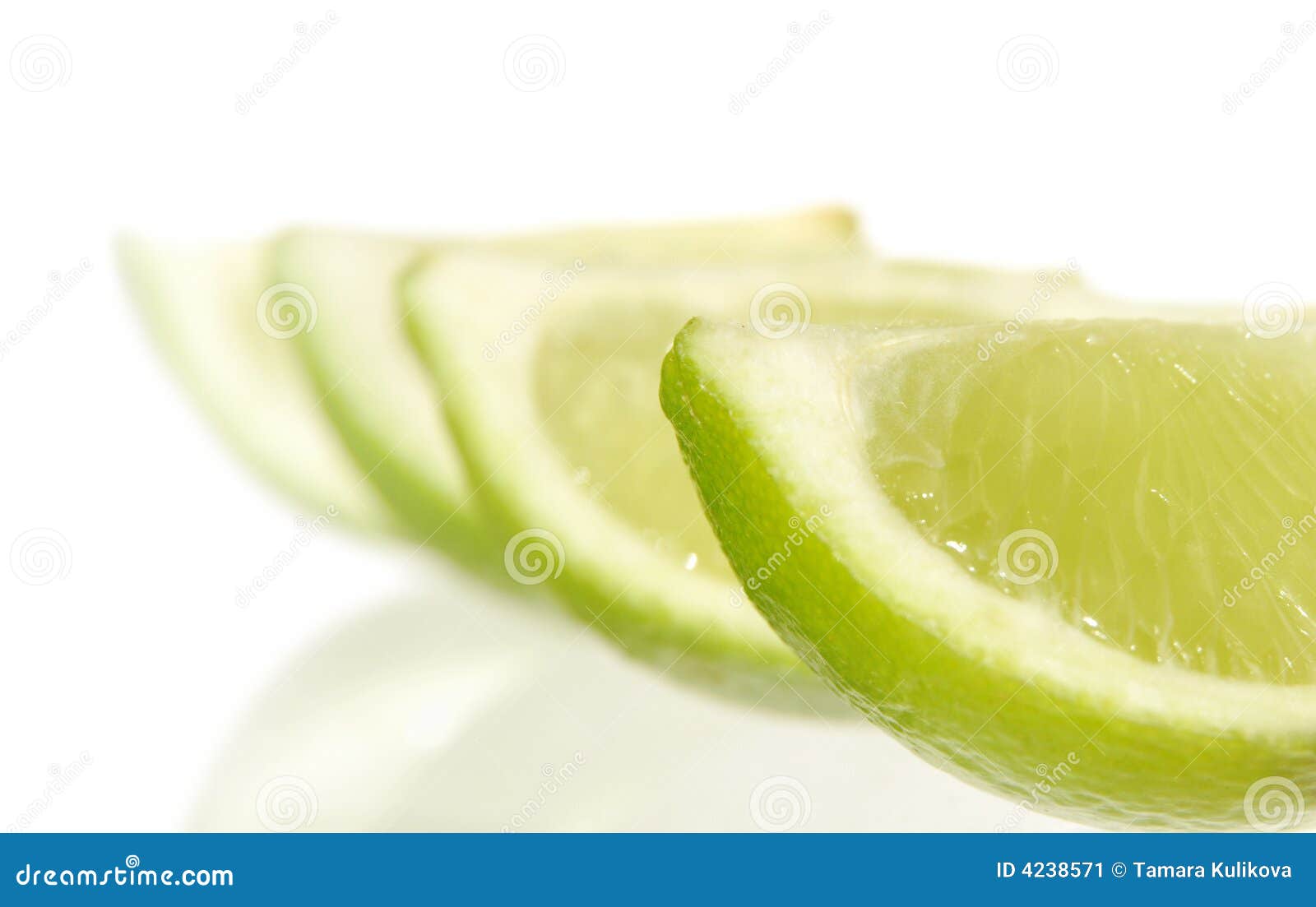Lime quarters stock image. Image of sour, white, green - 4238571