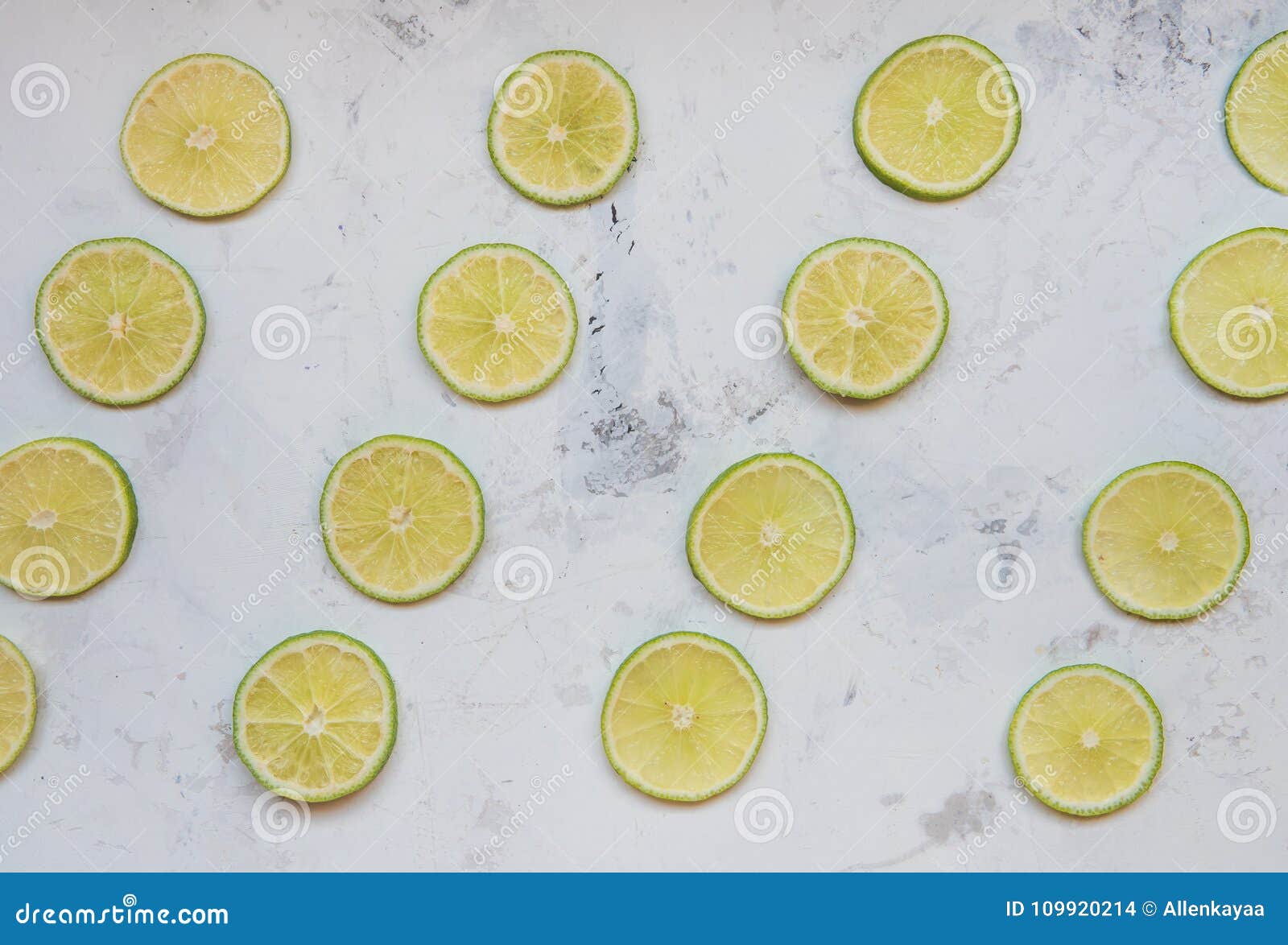 Lime Slices in Rows on a Light Background Top View Stock Photo - Image ...