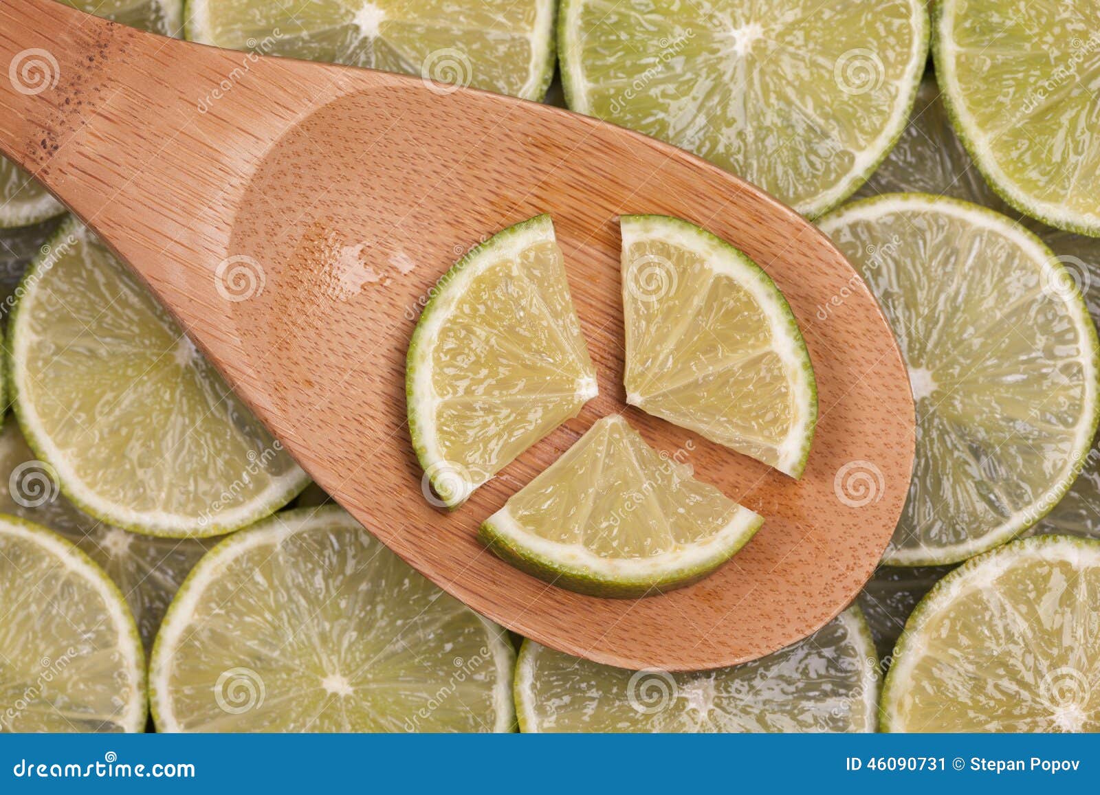 Lime Slices in a Wooden Spoon Stock Image - Image of horizontal, wooden ...