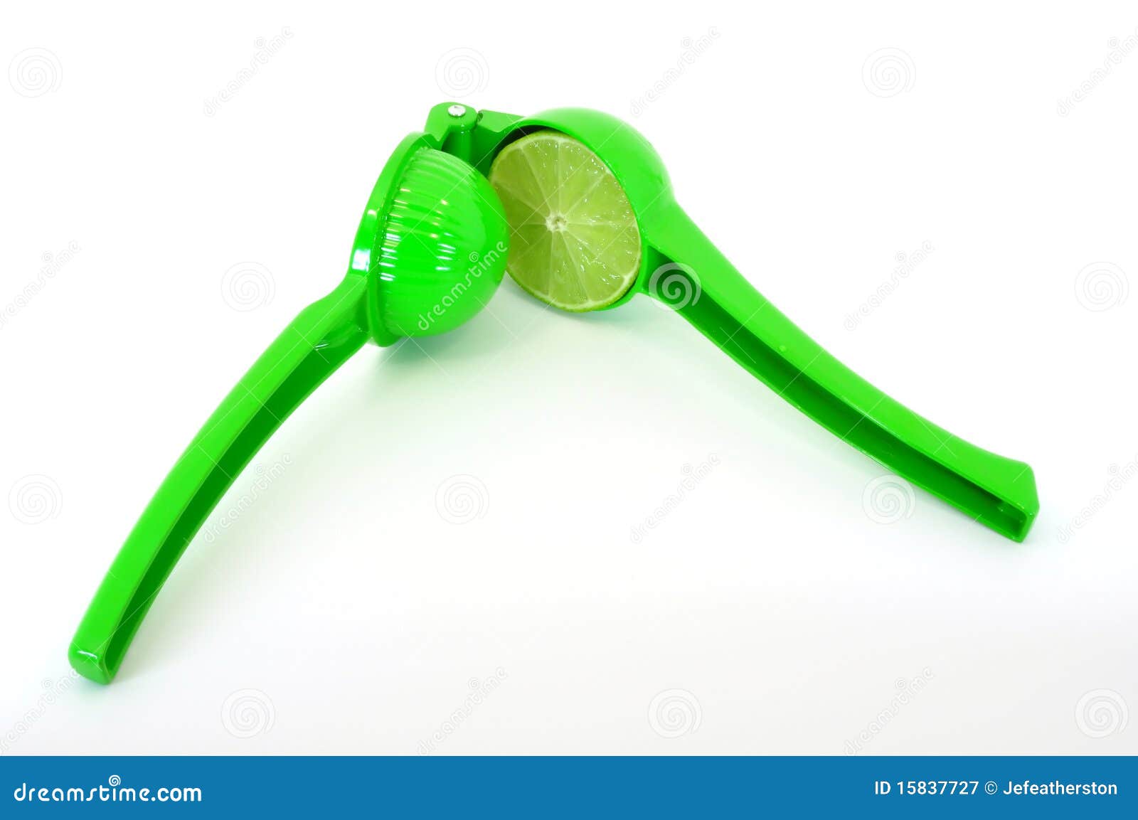 Lime in squeezer stock image. Image of open, lime, green - 15837727