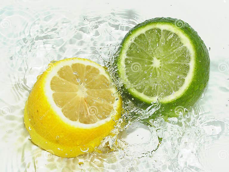 Lime vs Lemon stock photo. Image of splash, food, beverage - 27024