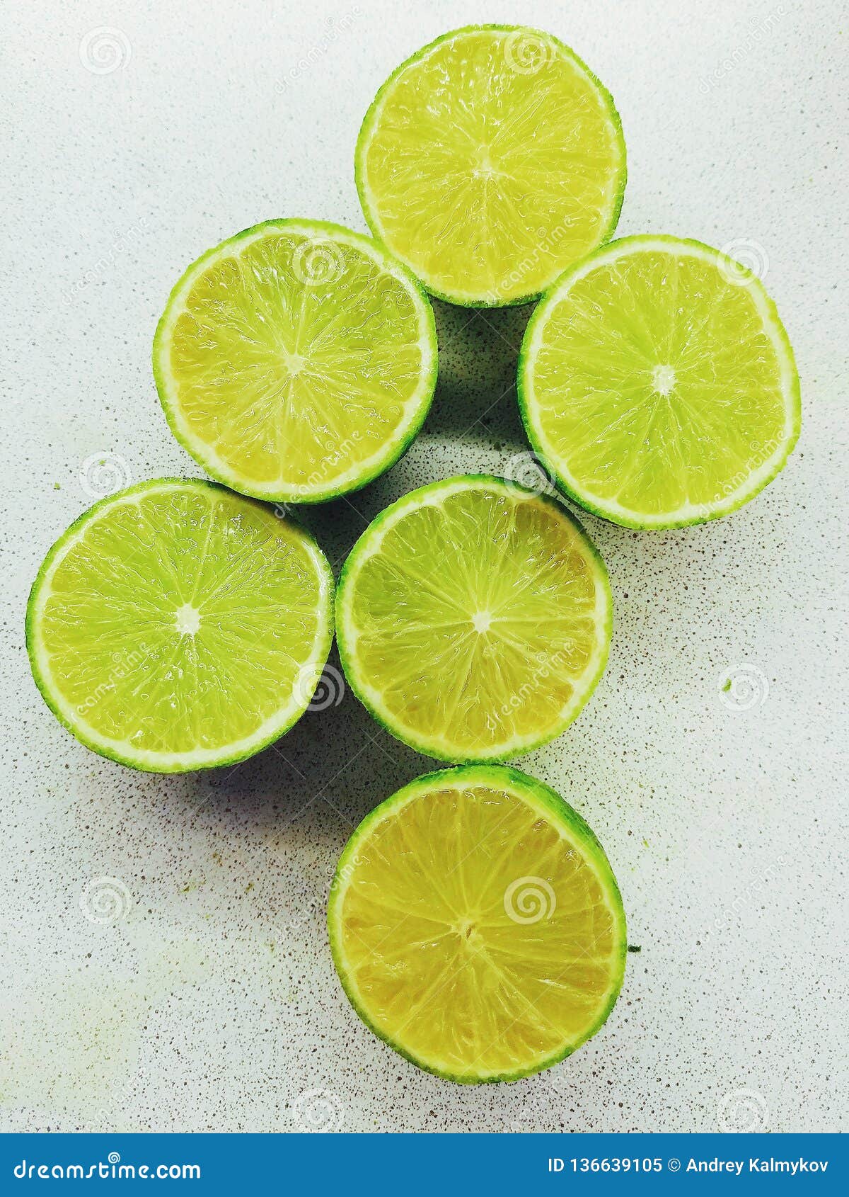 Limes on a table stock image. Image of fruit, green - 136639105