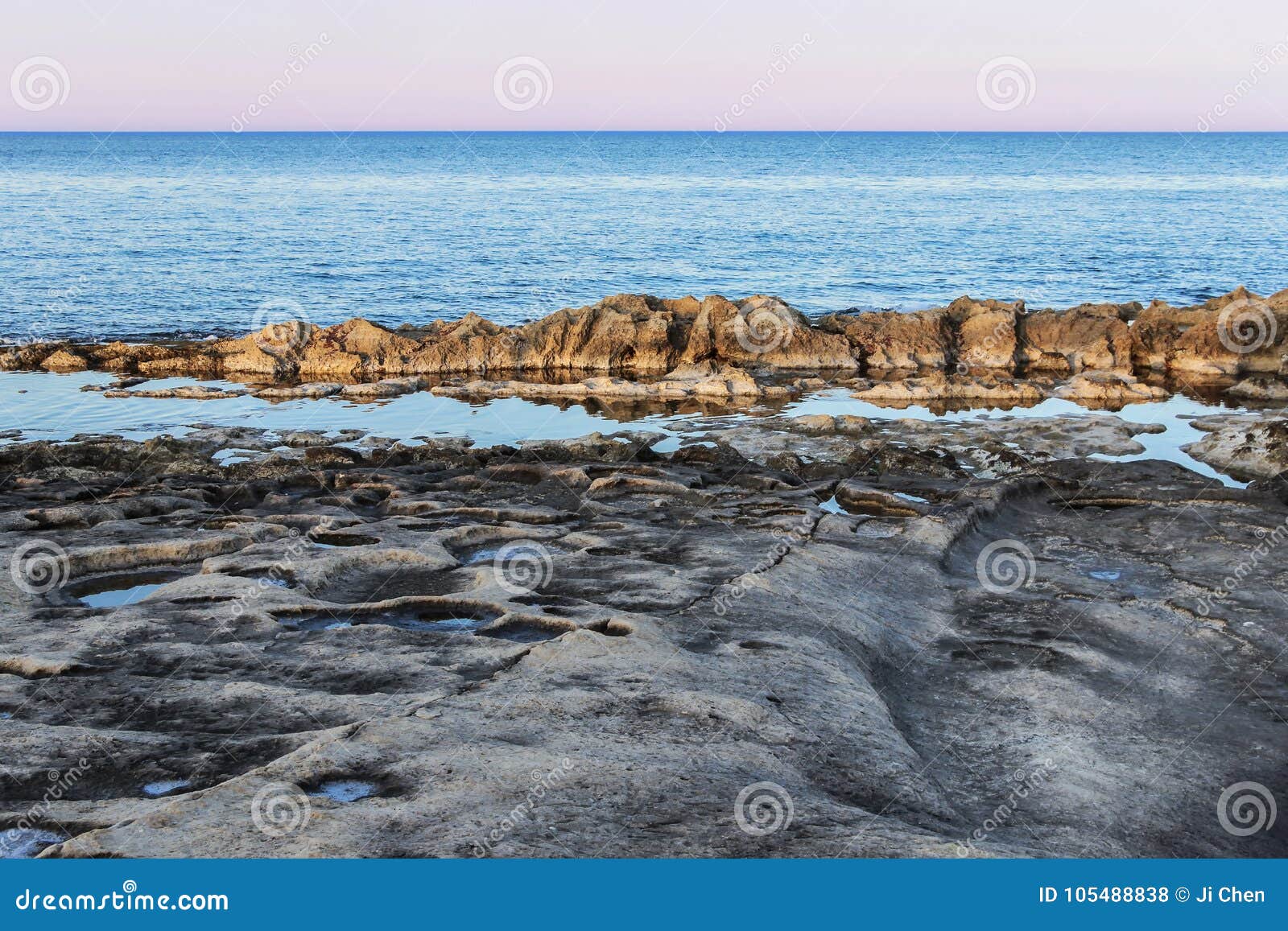 Limestone Beach in Malta at Sunset Stock Photo - Image of rock, clear ...