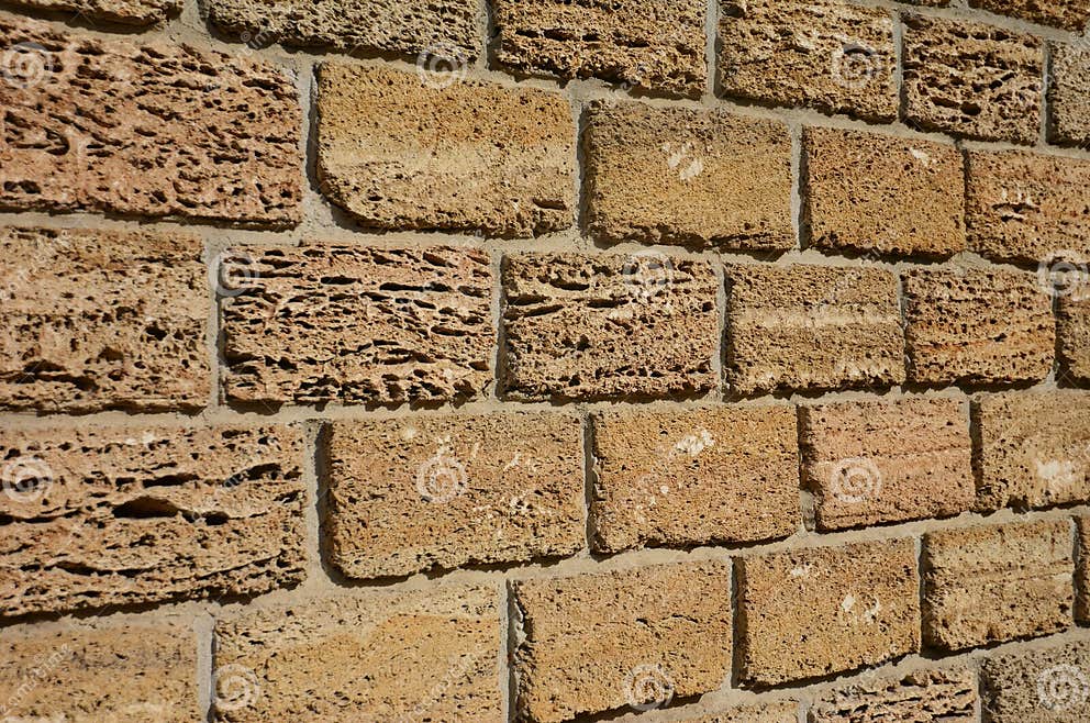 Limestone Blocks Textured Background. Limestone Blocks Wall Stock Photo ...
