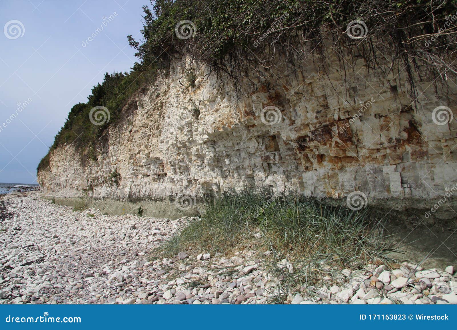 Limestone Cliff Along a Stony Shore Stock Image - Image of landscapes ...