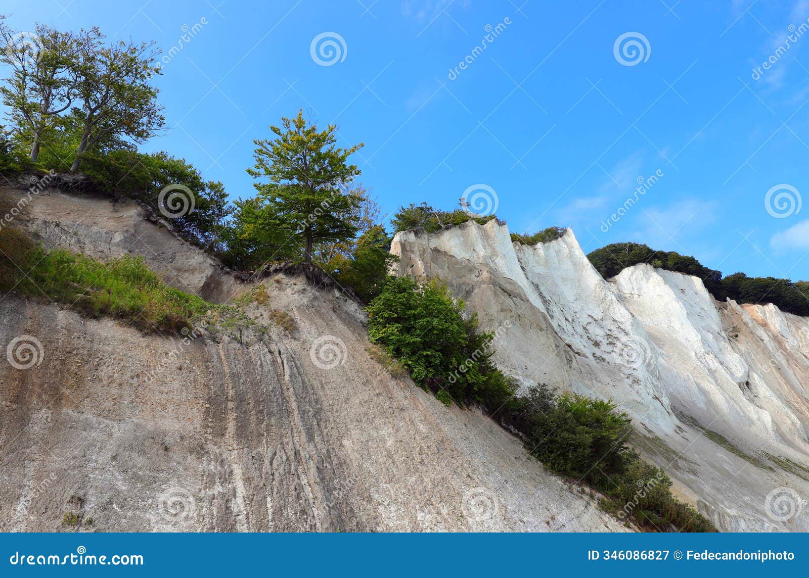 Limestone Cliff Undergoing Erosion Viewed from Below with Plants ...
