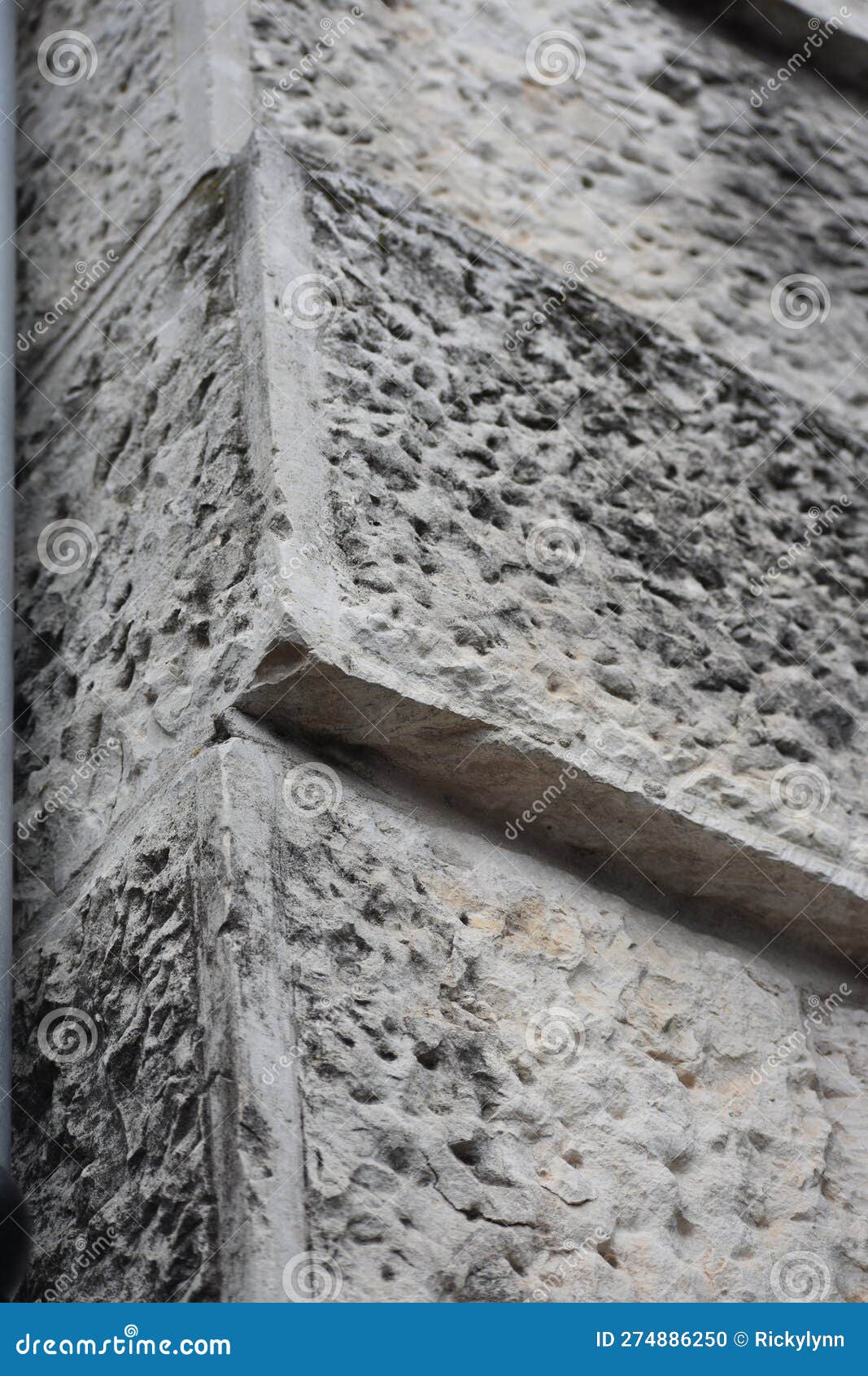 Limestone Coin Corner Stone Stock Photo - Image of street, iron: 274886250