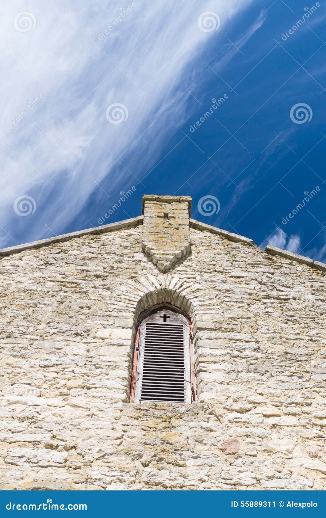 Limestone Facade of Ancient Church with Window Shutter and Cross Stock ...