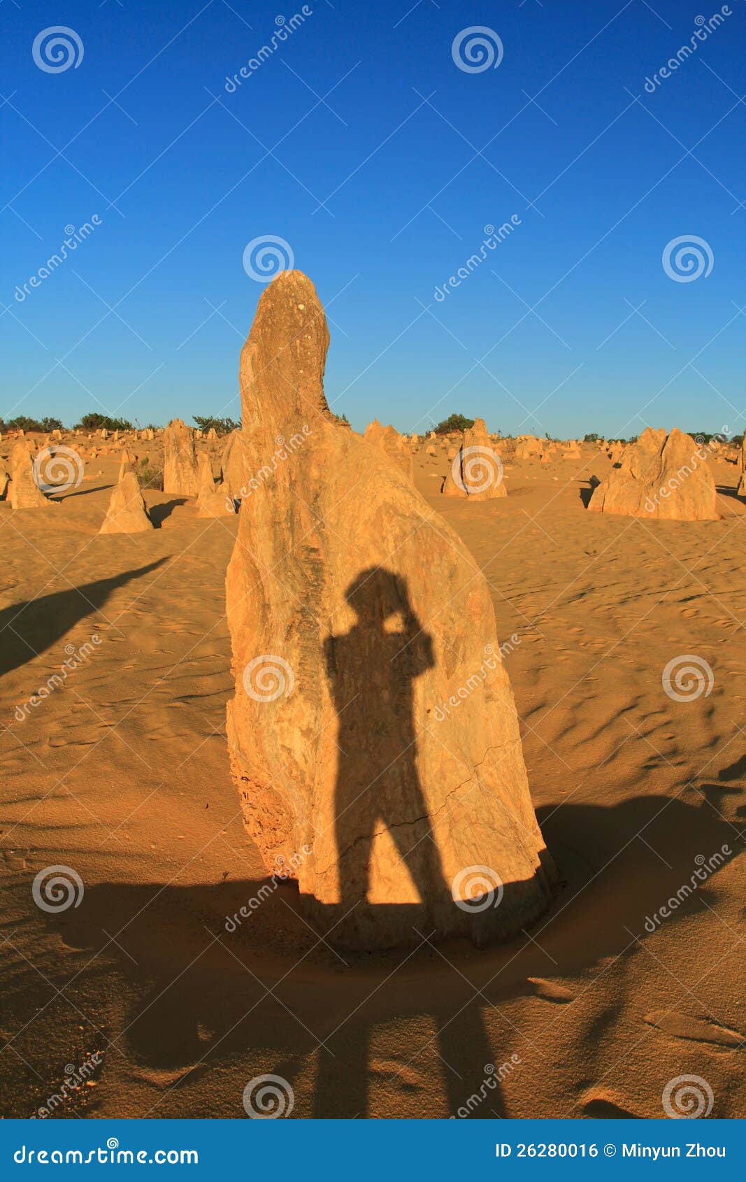 Limestone Pillars with Photographer Shadow Stock Photo - Image of ...