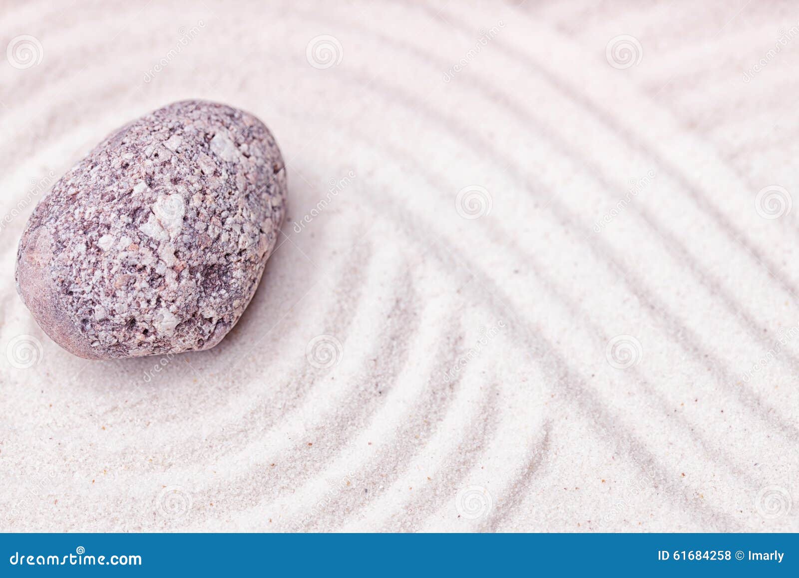 A Limestone Stone in the Fine Sand of the Zen Garden Stock Photo ...