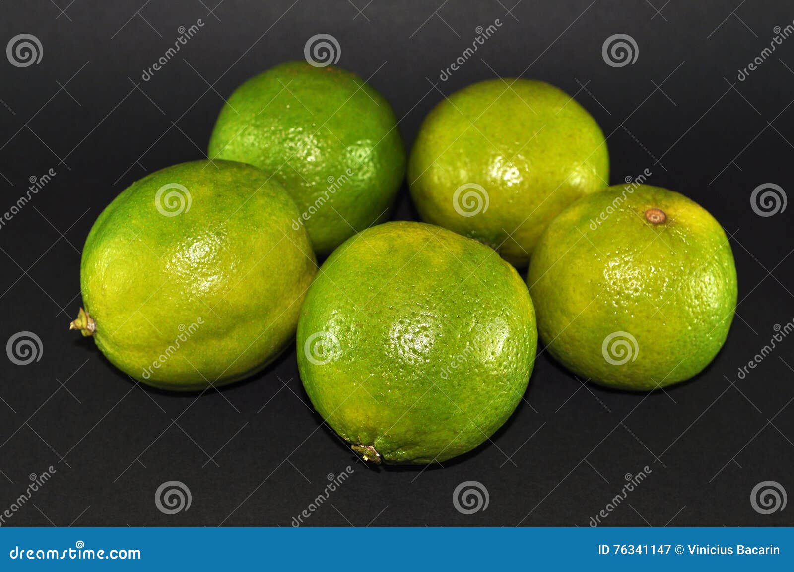 Limones verdes imagen de archivo. Imagen de ingrediente - 76341147