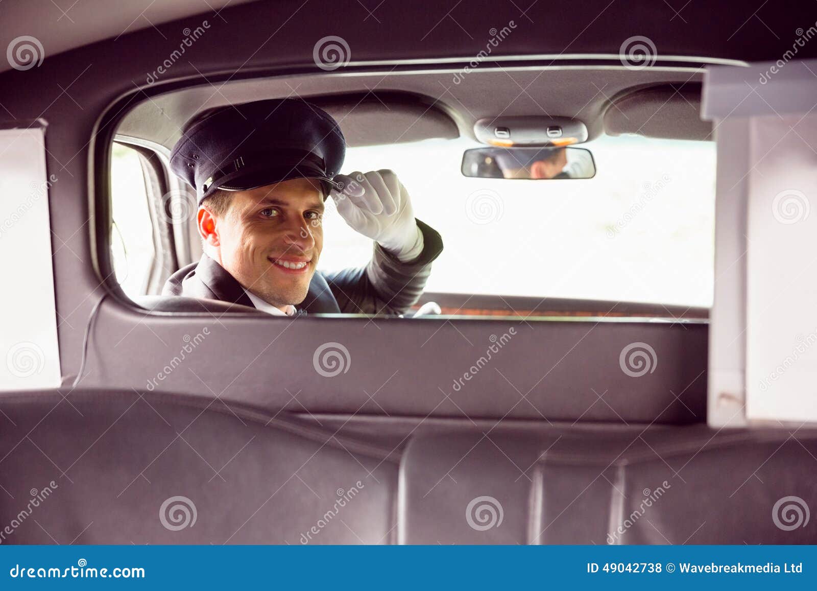 Limousine Driver Smiling at Camera Stock Photo - Image of smiling, male ...