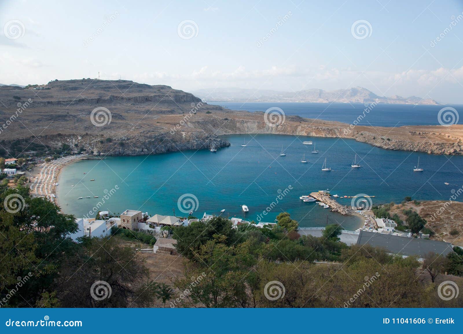 Lindos bay in sunset stock photo. Image of beach, cloud - 11041606