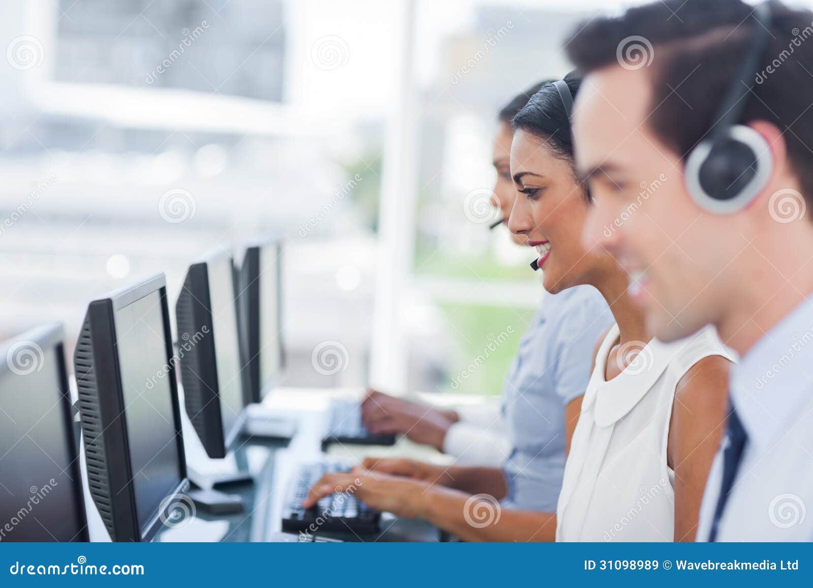 Line of Agents Working on Computers Stock Image - Image of smiling ...