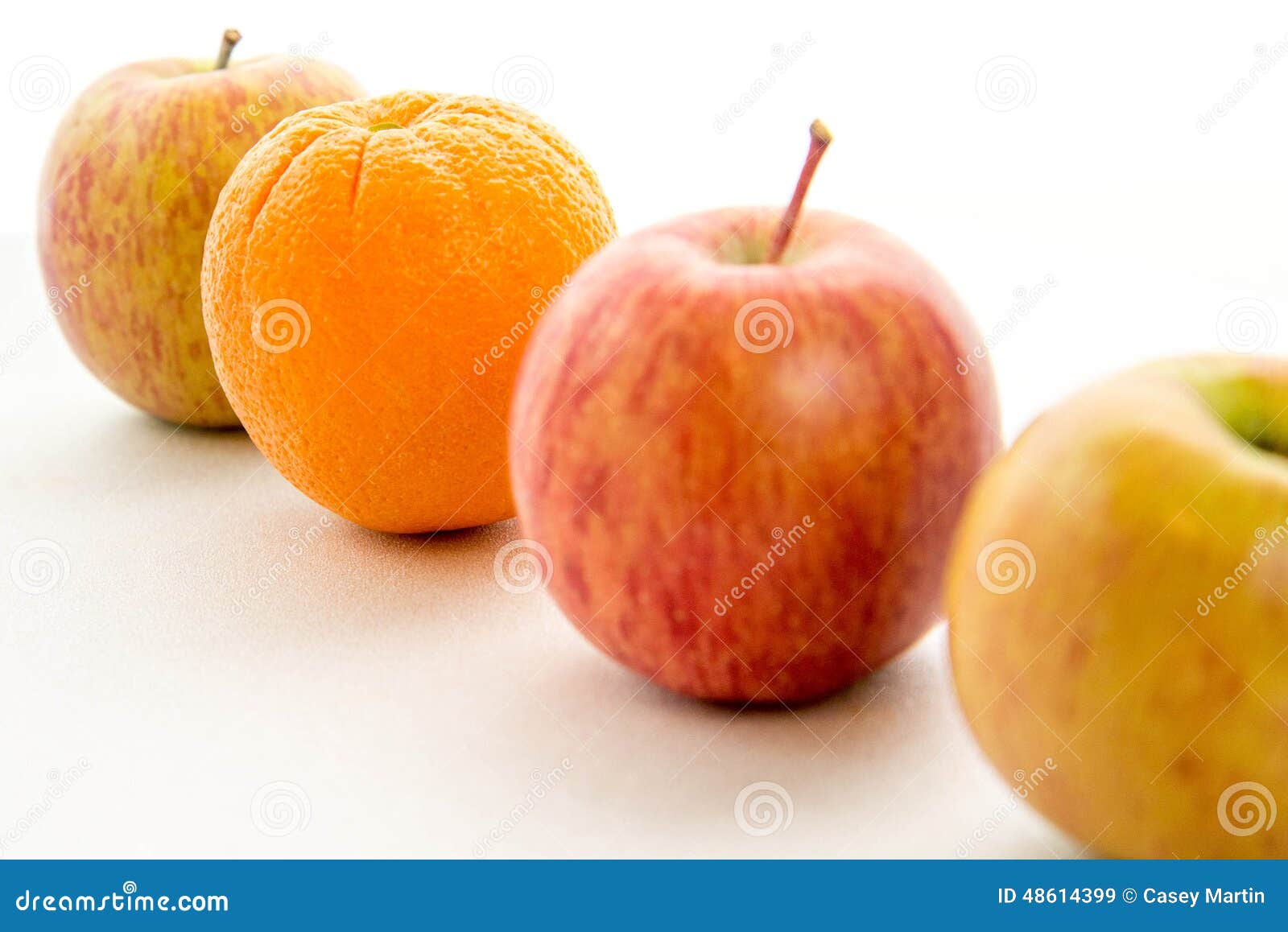 Line of Apples with One Orange Stock Image - Image of concept, apples ...