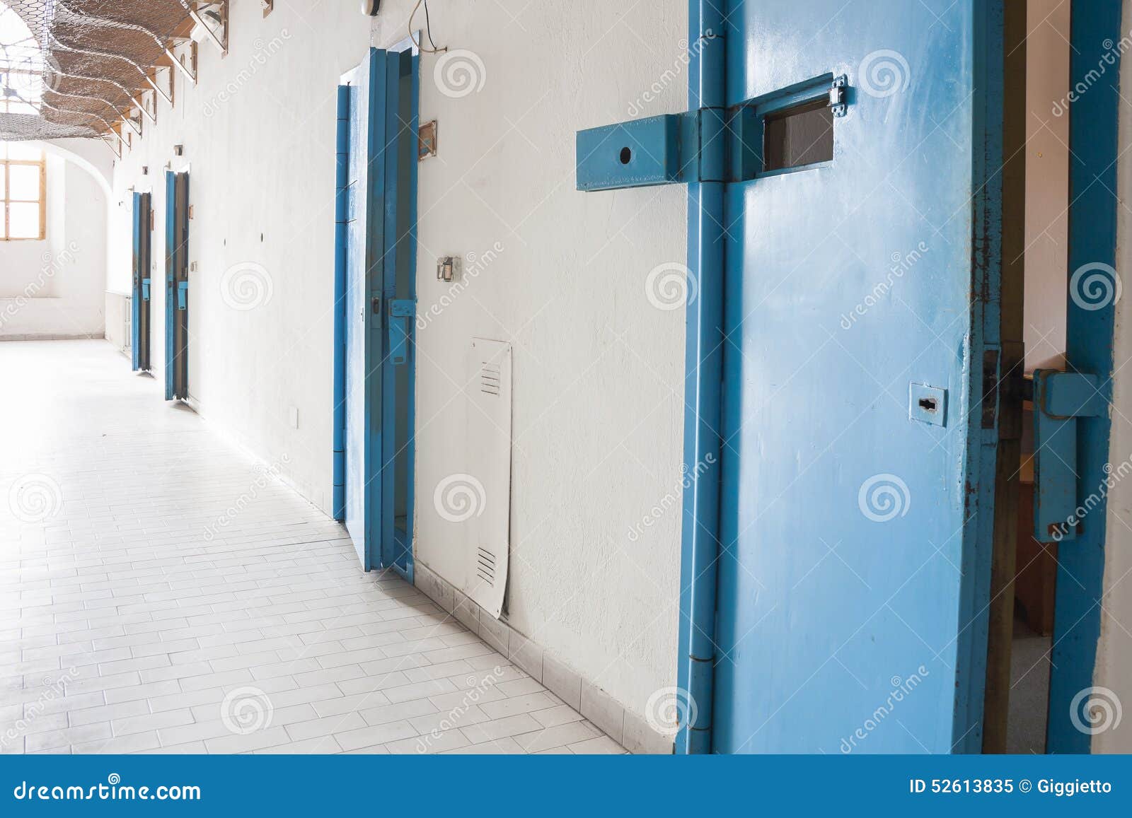 Line of armored doors stock image. Image of grilled, light - 52613835