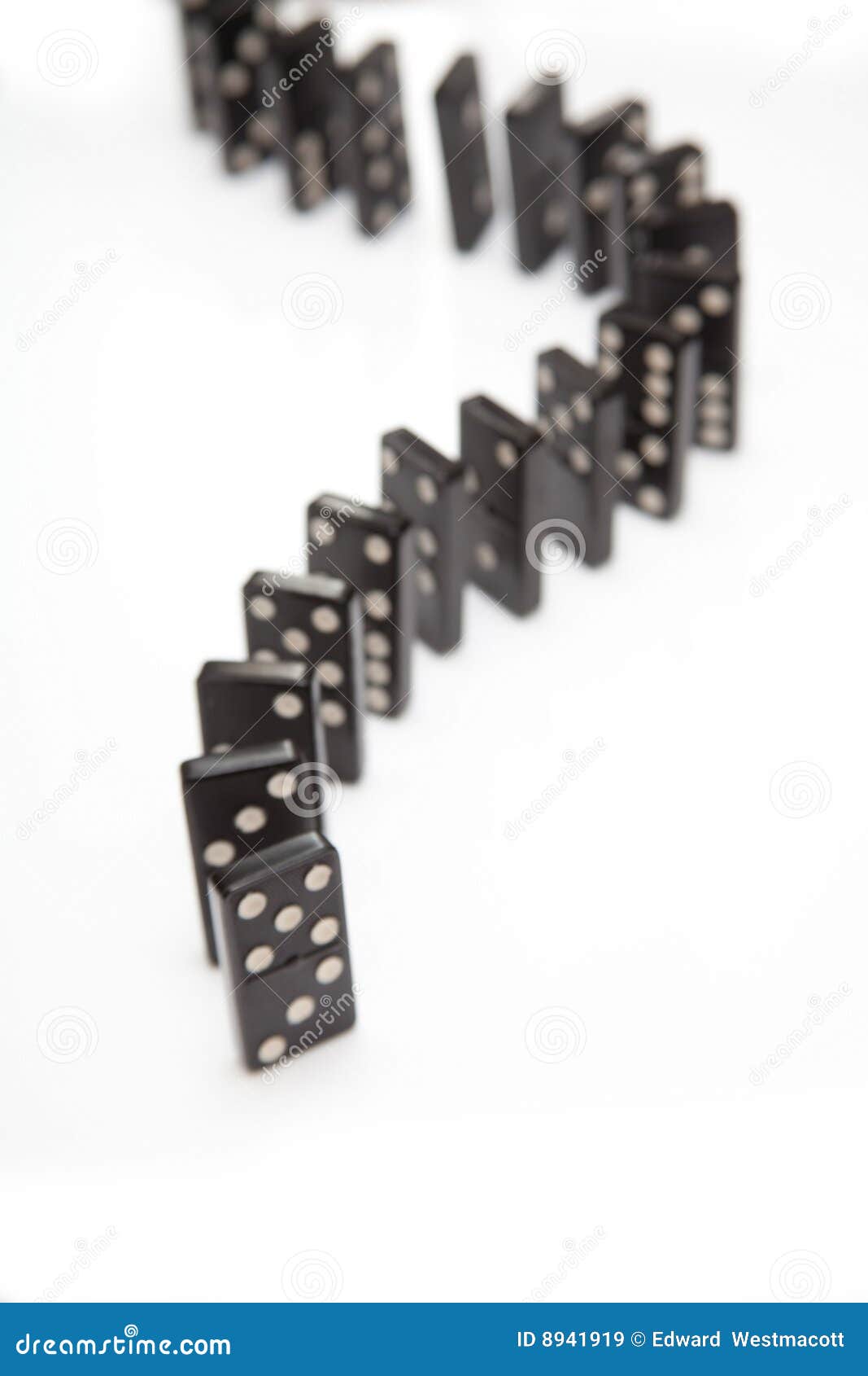 Line of balanced dominoes stock image. Image of domino - 8941919