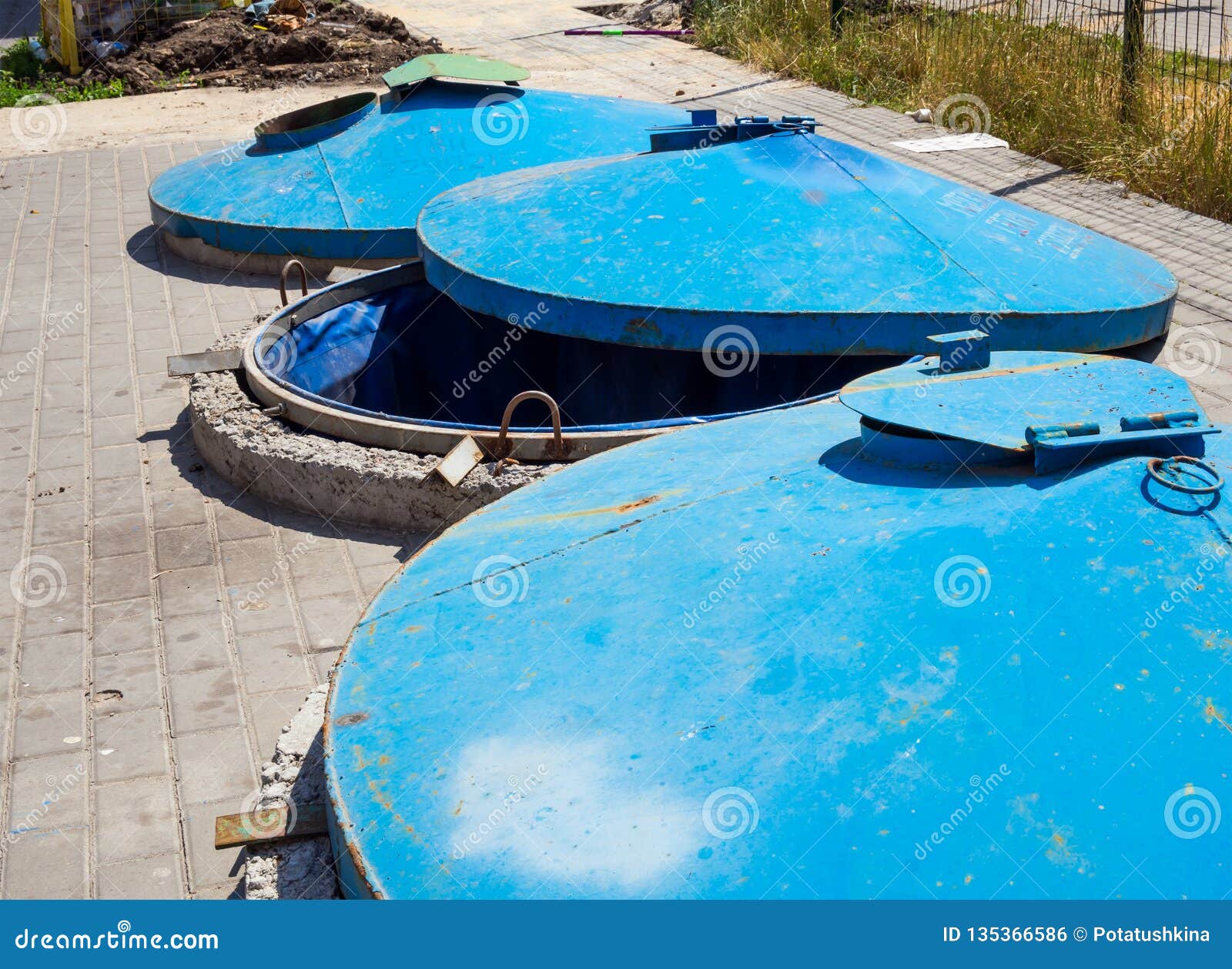 Line of Buried Waste Containers on the Site for Household Waste Stock ...
